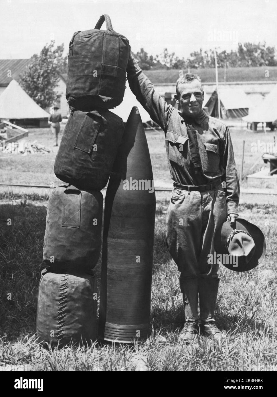 United States: July 28, 1917 A student officer stands next to a 14 inch ...