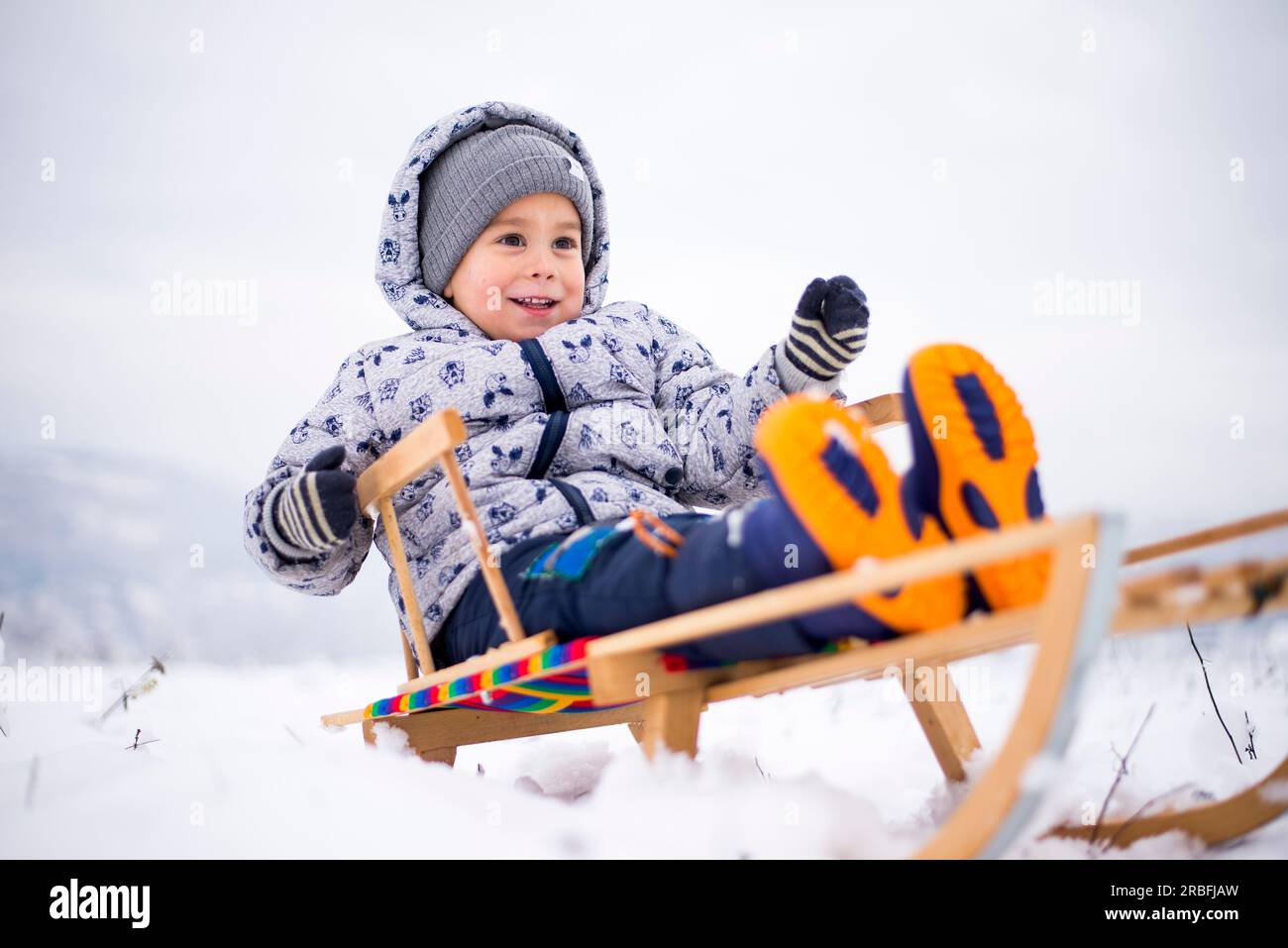 Happy sledding hi-res stock photography and images - Alamy