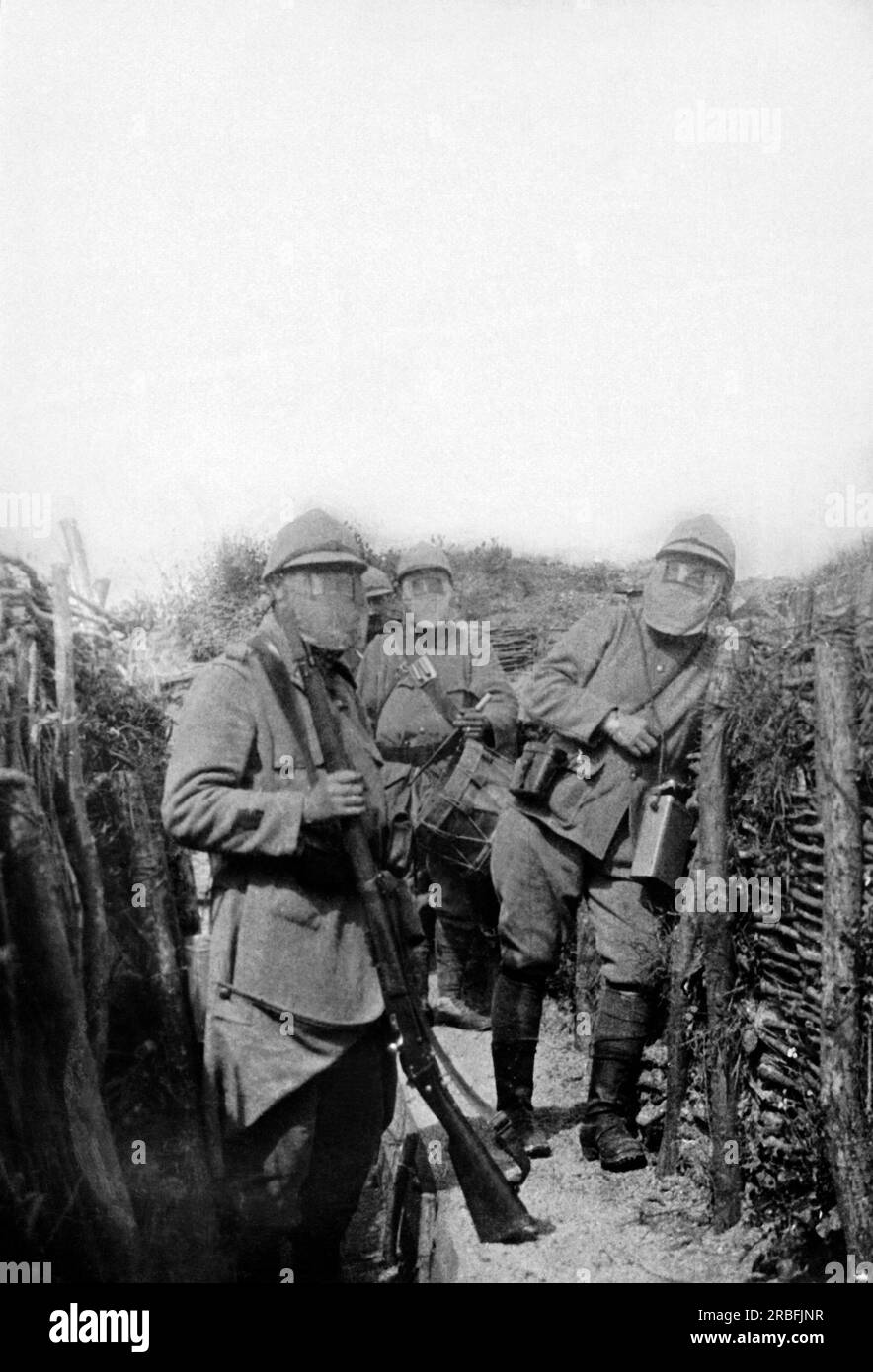 France, c. 1915 French soldiers wearing gas masks in their trenches ...