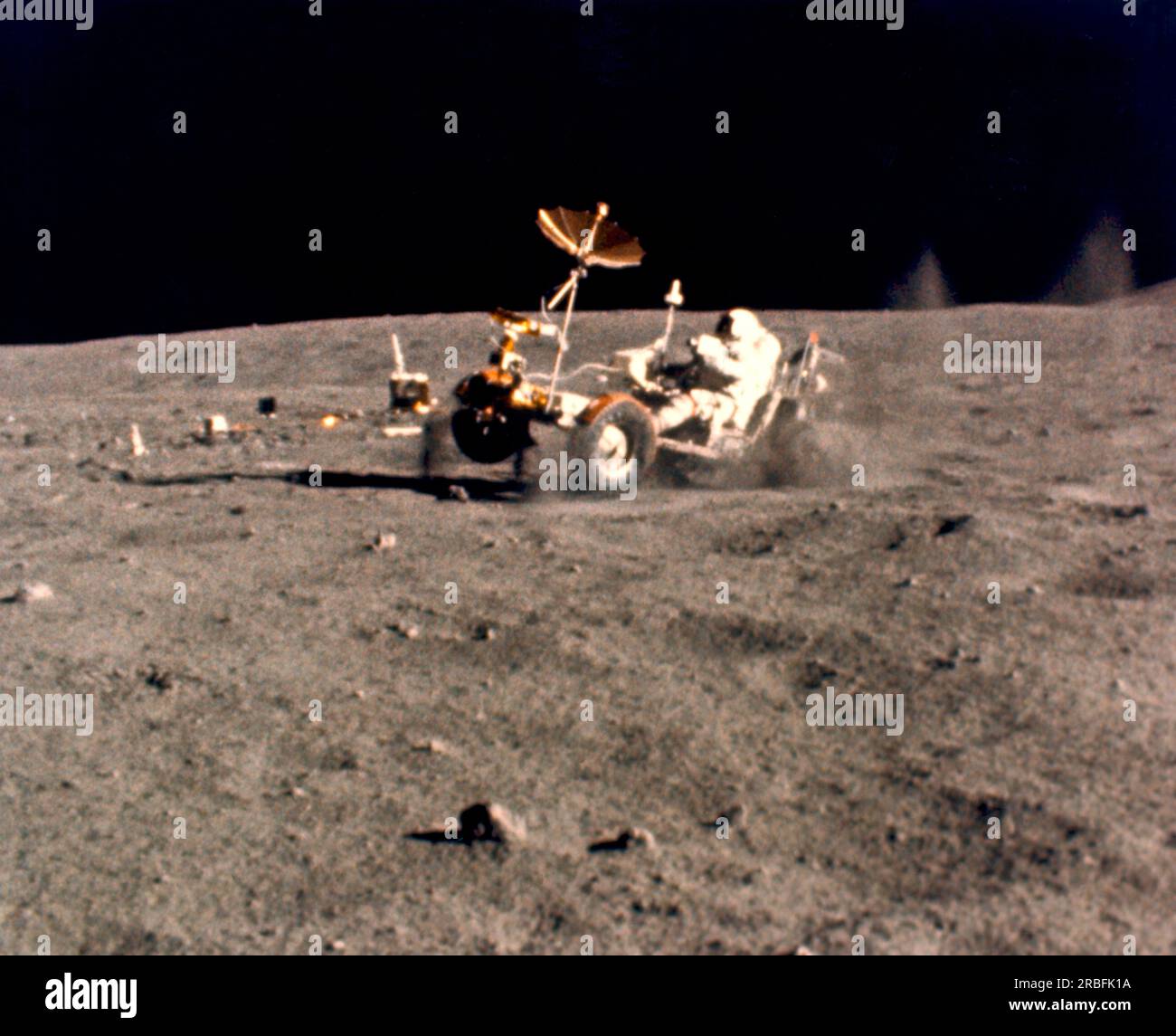 Moon: April 23, 1972 Astronaut John Young gives the Lunar Roving ...