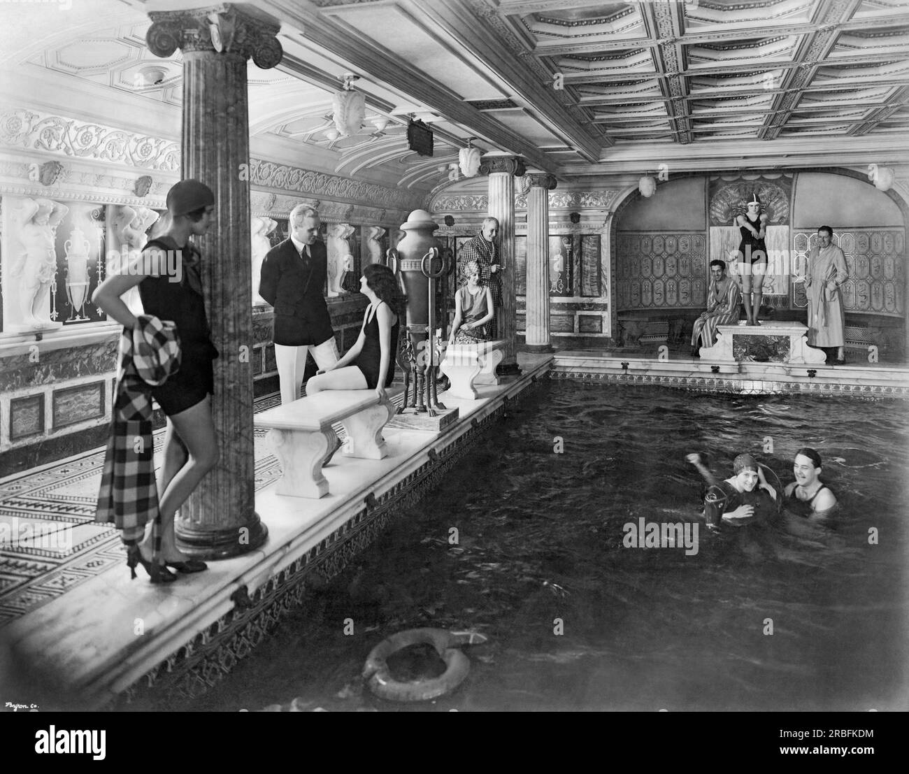 Italy: c. 1927 Passengers lounging around the Pompeian indoor pool on ...