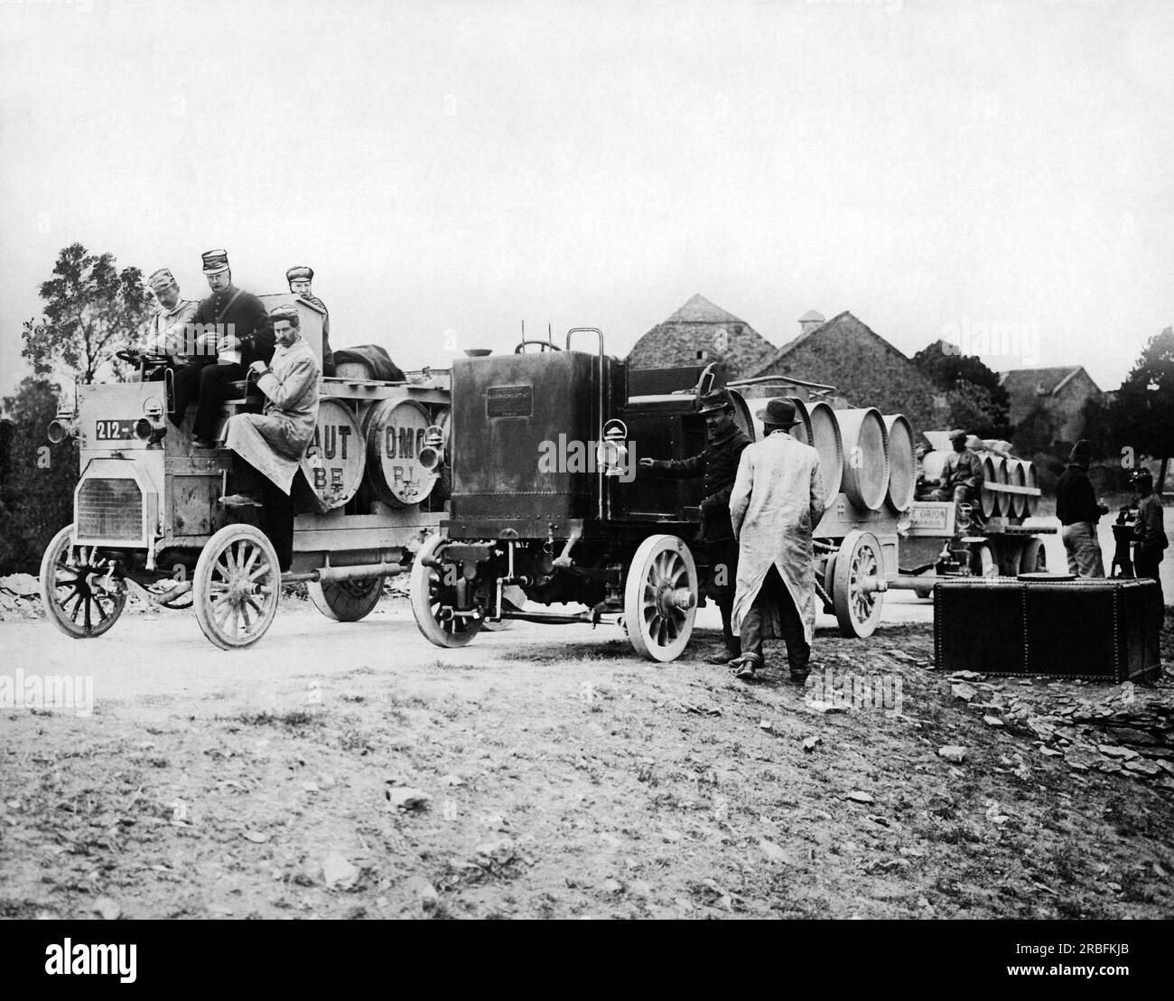 France: February, 1915 Motor-driven trucks which follow in the wake of ...