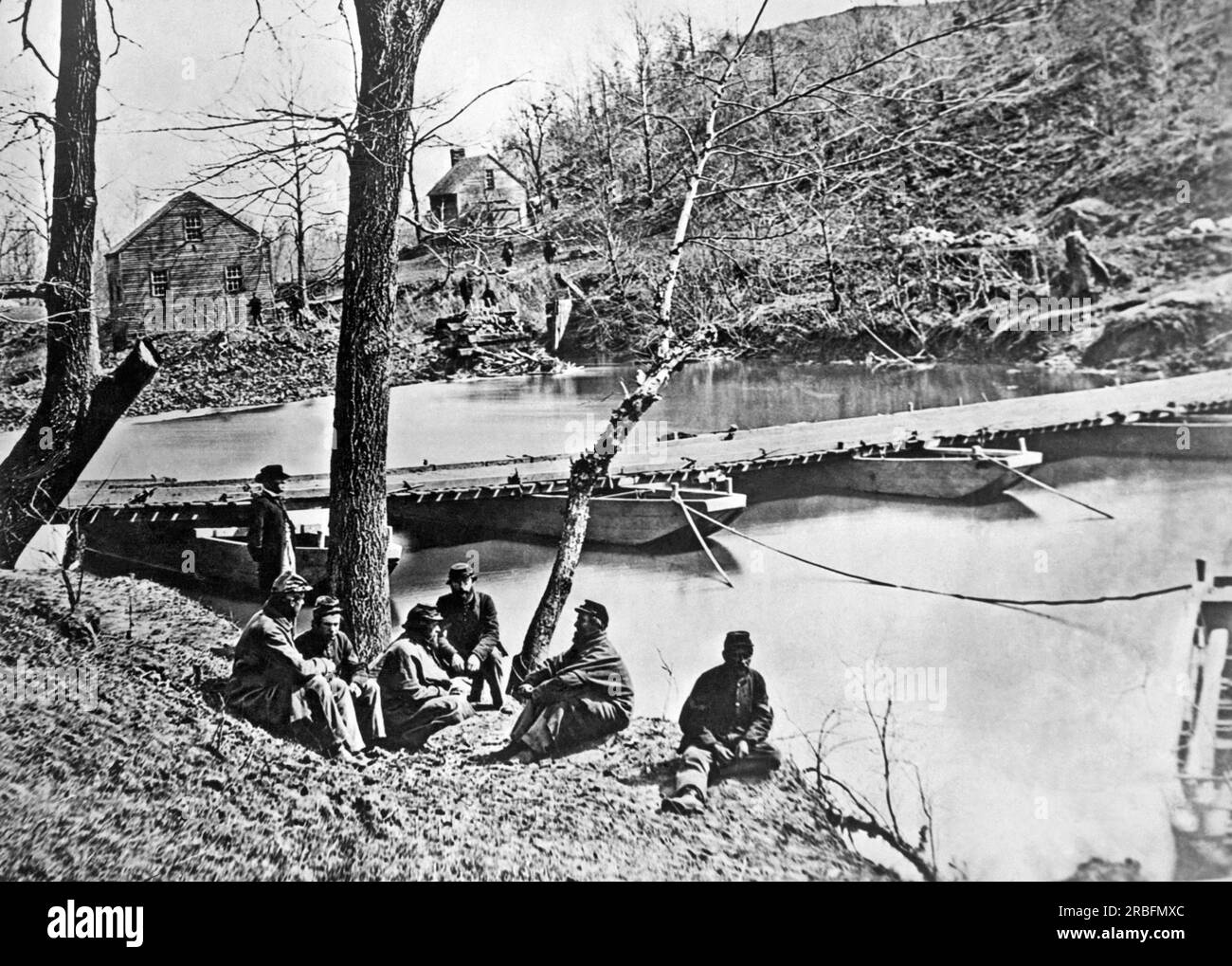Bull Run, Virginia: c. 1863. Troops gathered by the pontoon bridge at ...