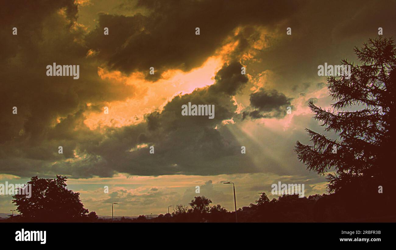 God rays over black hi-res stock photography and images - Alamy