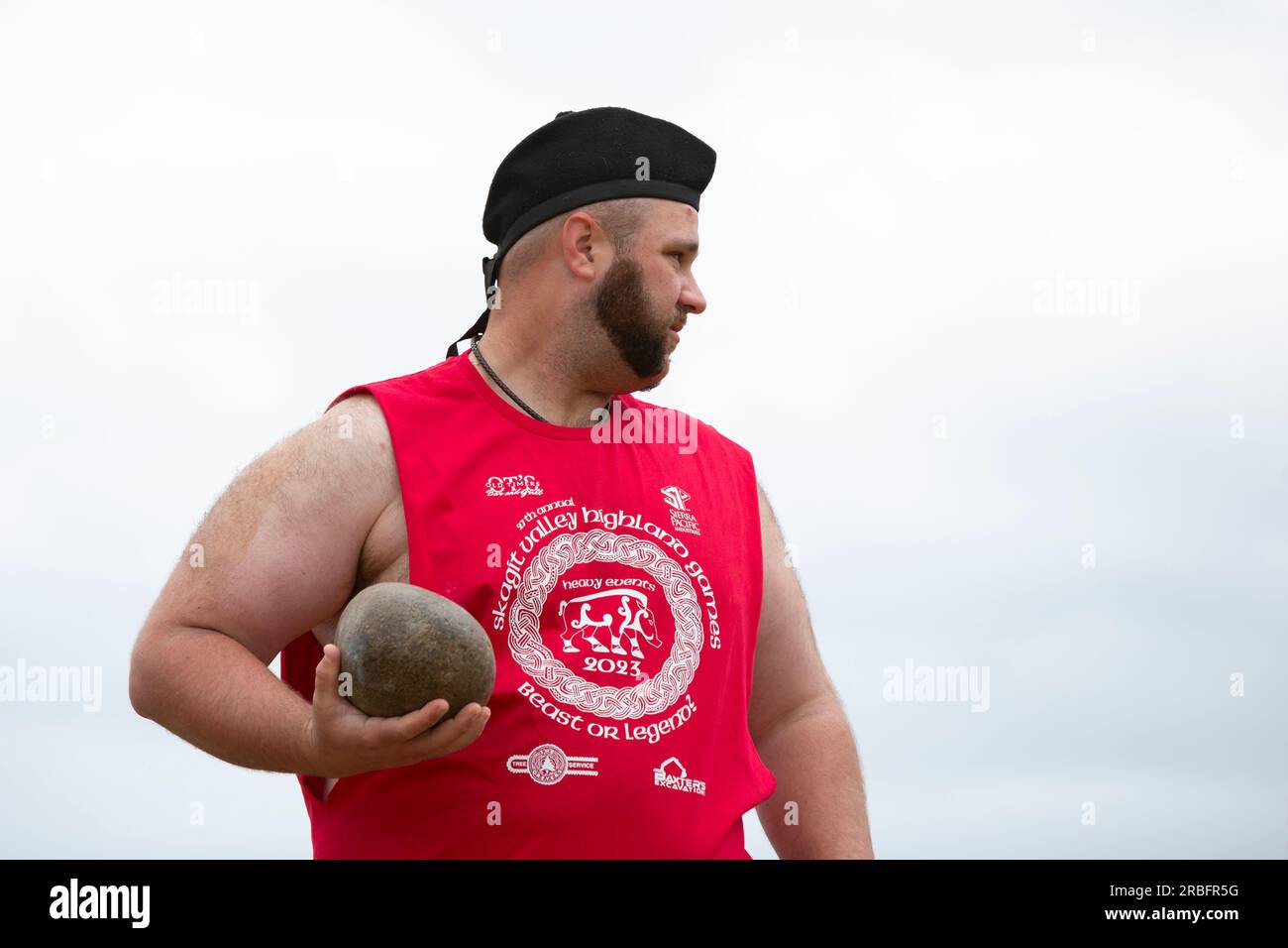 An athlete prepares for the stone put competition at the Skagit Valley ...