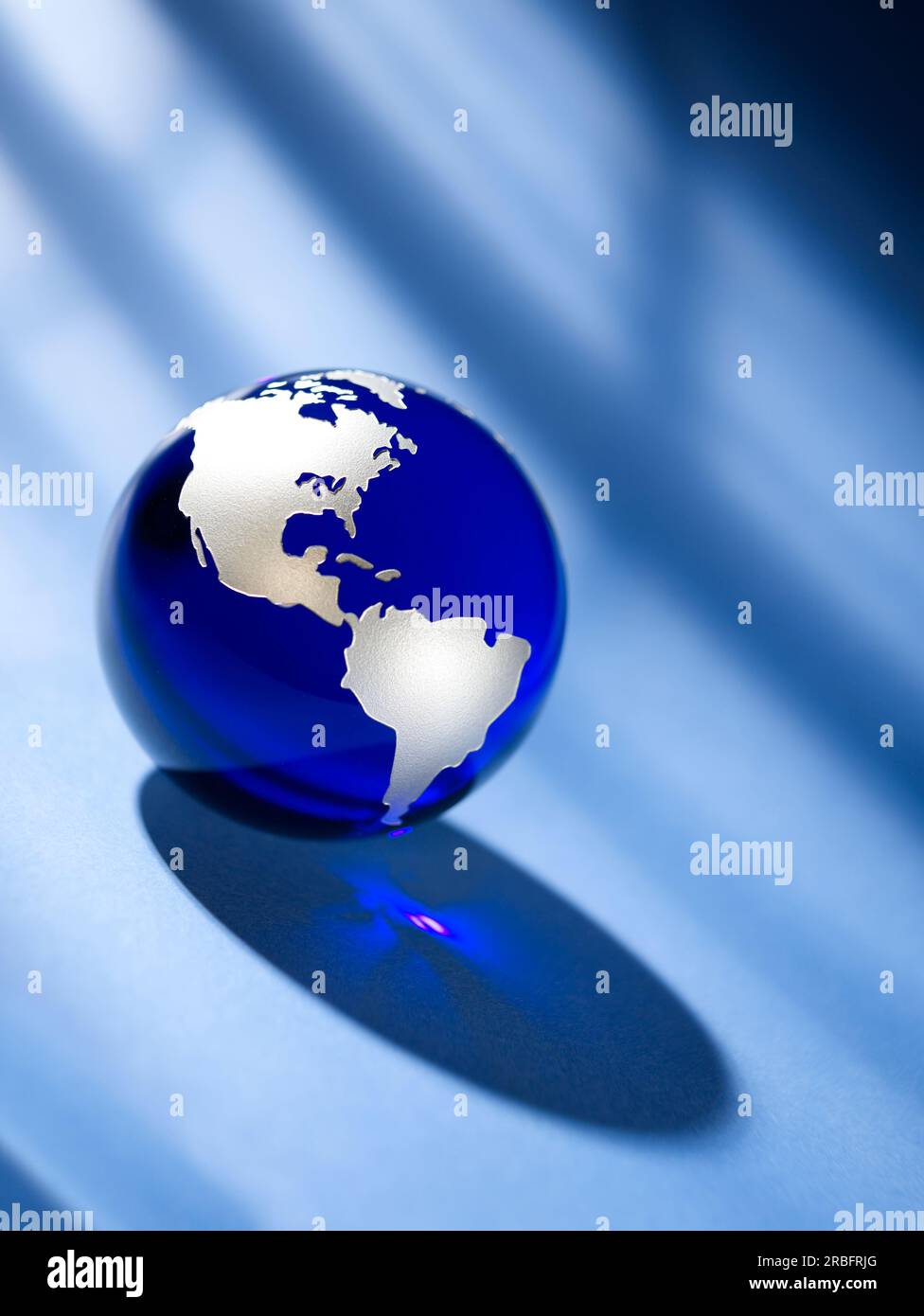 silver and blue globe Stock Photo - Alamy
