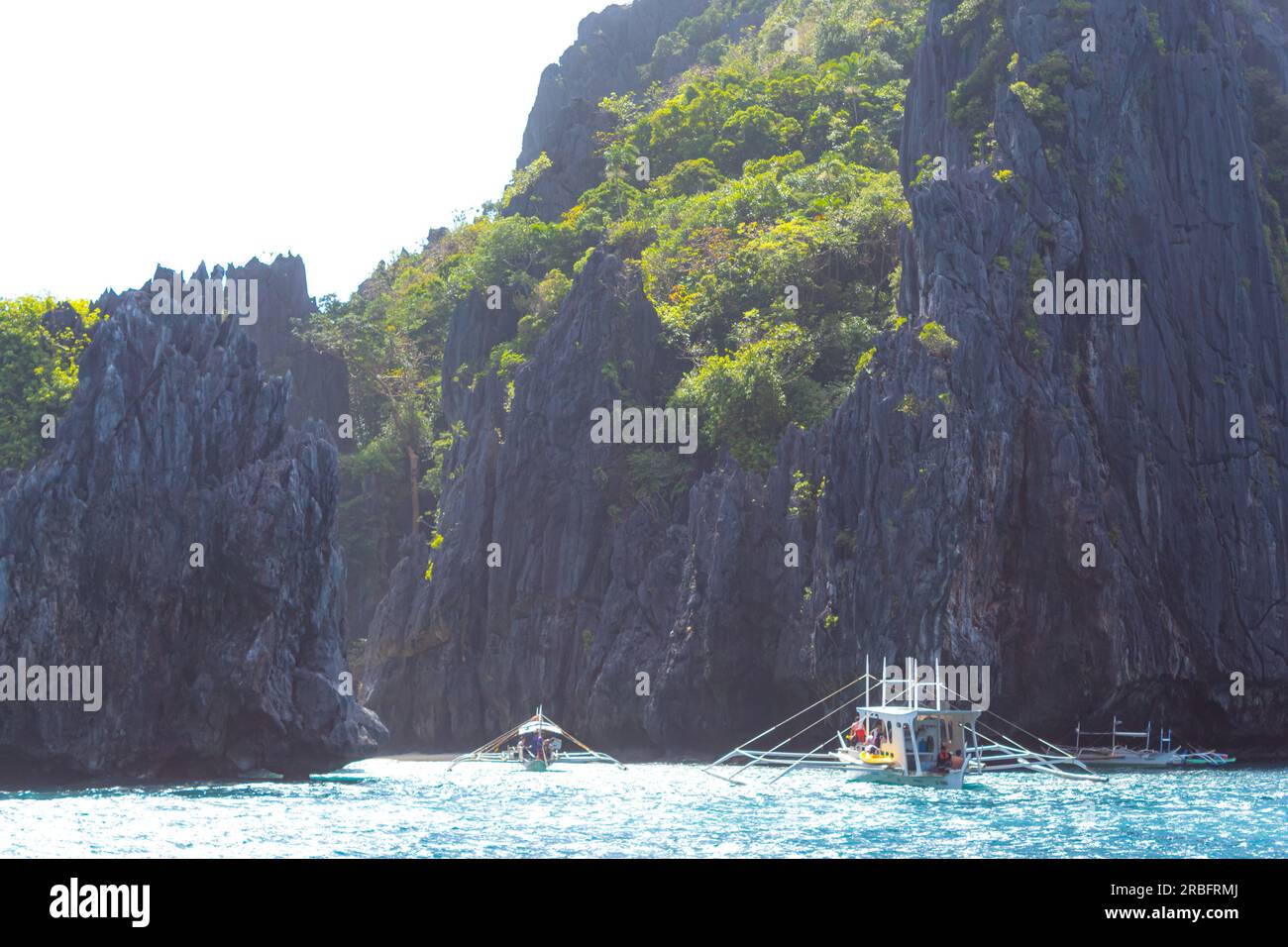 Traditional filipino boats bangka or banca at the blue lagoon in El ...
