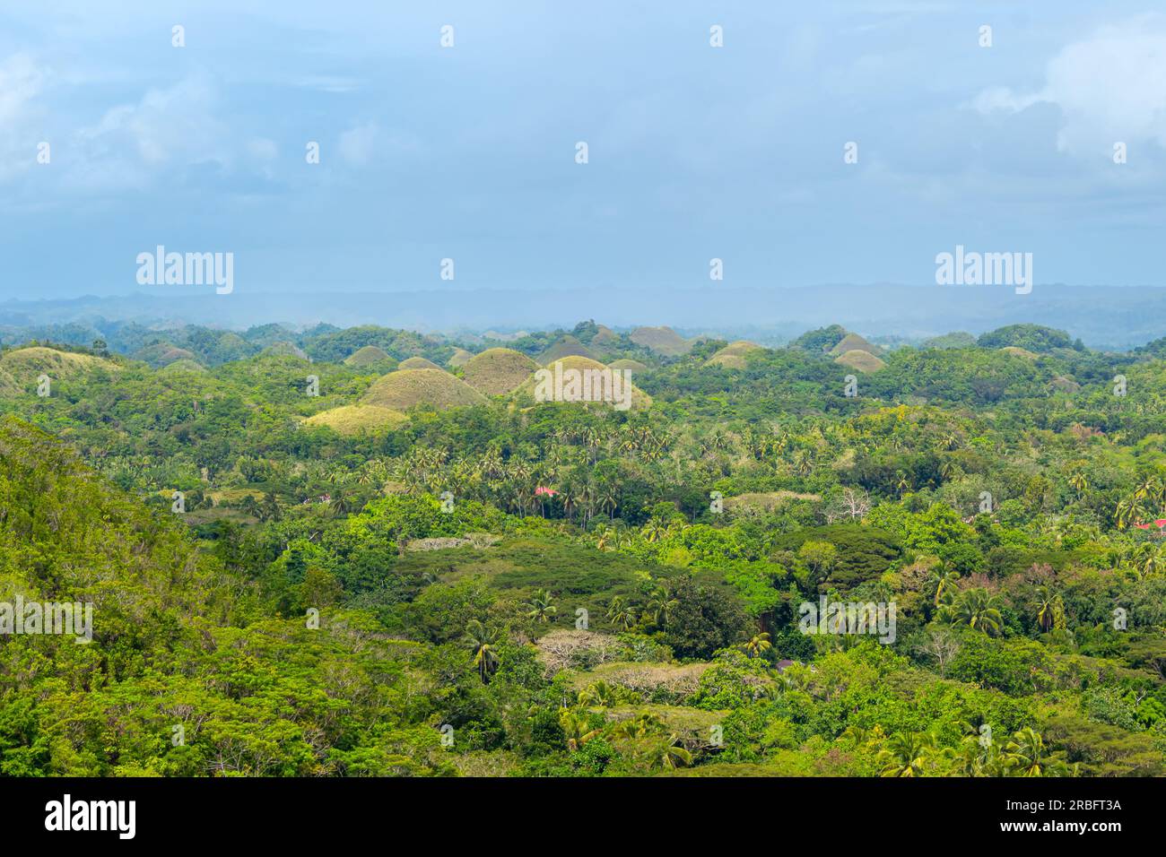Aerial view of farmland and conical limestone karsts in the unique ...