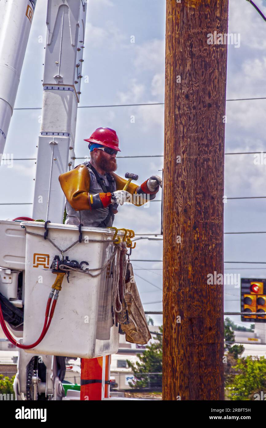 6-23-23 Tulsa USA Lineman Utility worker in bucket working on electric ...