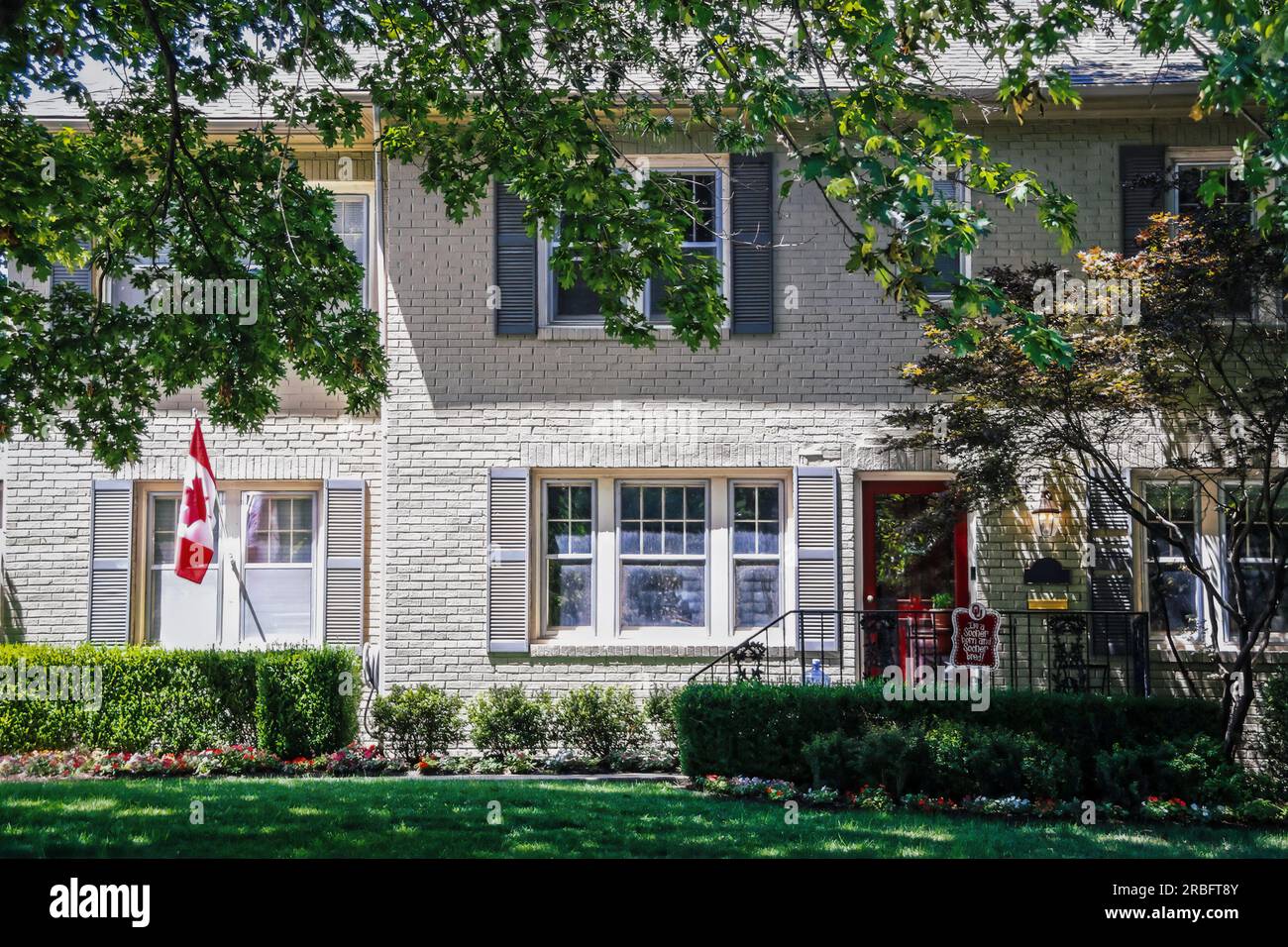 Nov 2017 Tulsa USA - Landscaped grey painted brick house entry with ...