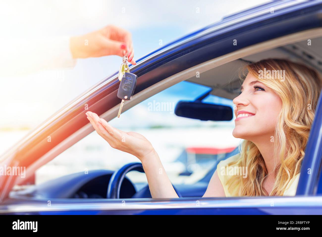 A woman's hand passes the key to the car Stock Photo - Alamy