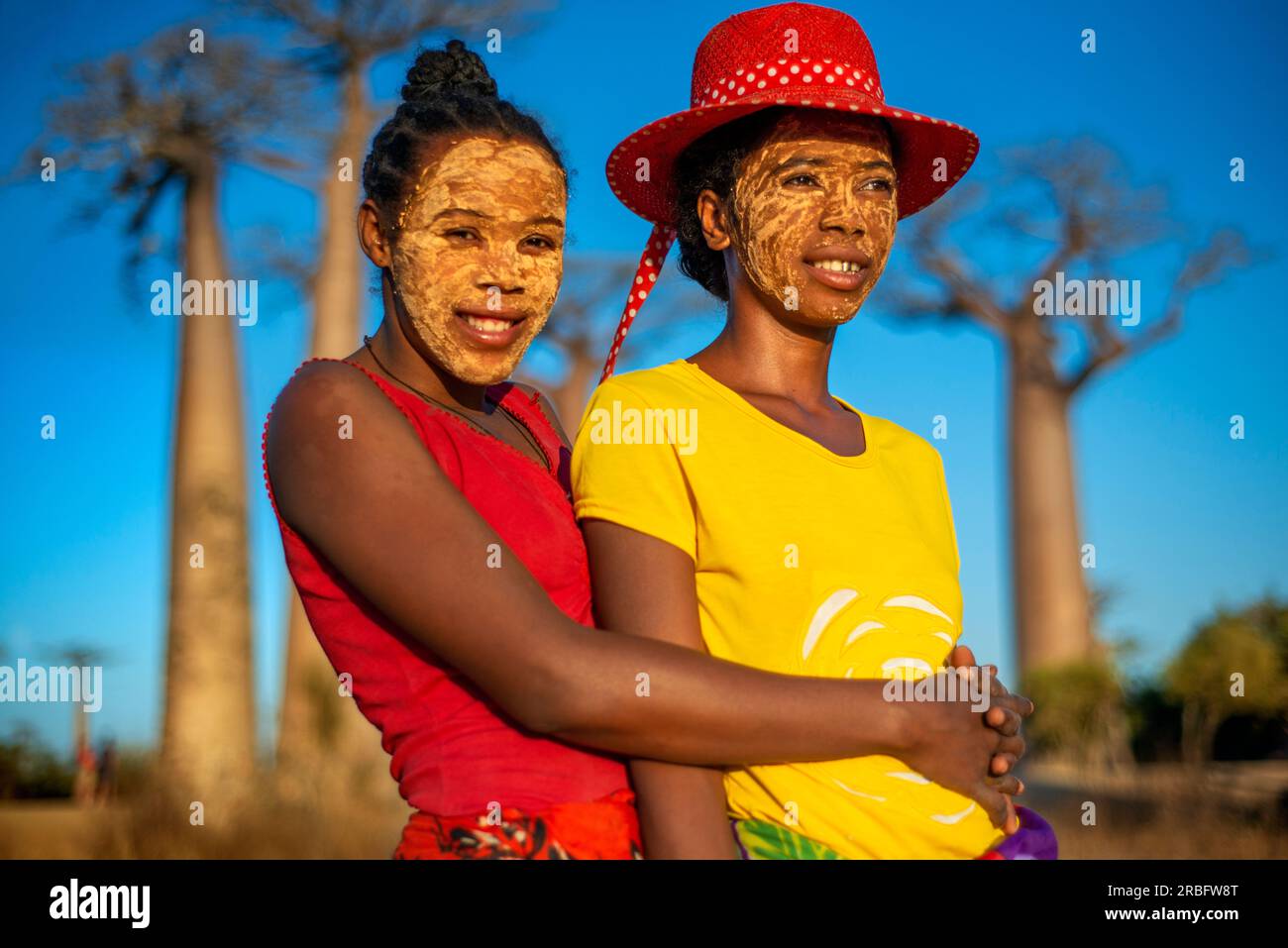 Malagasy morondava women in the baobab avenue of ethnic Sakalava with ...