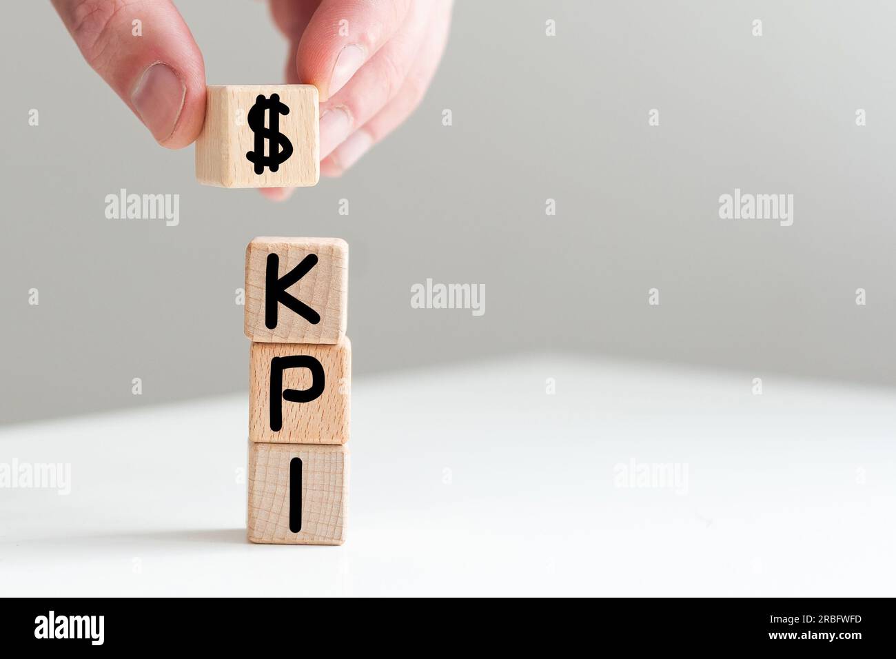 KPI word on cubes. Key performance indicator Stock Photo - Alamy