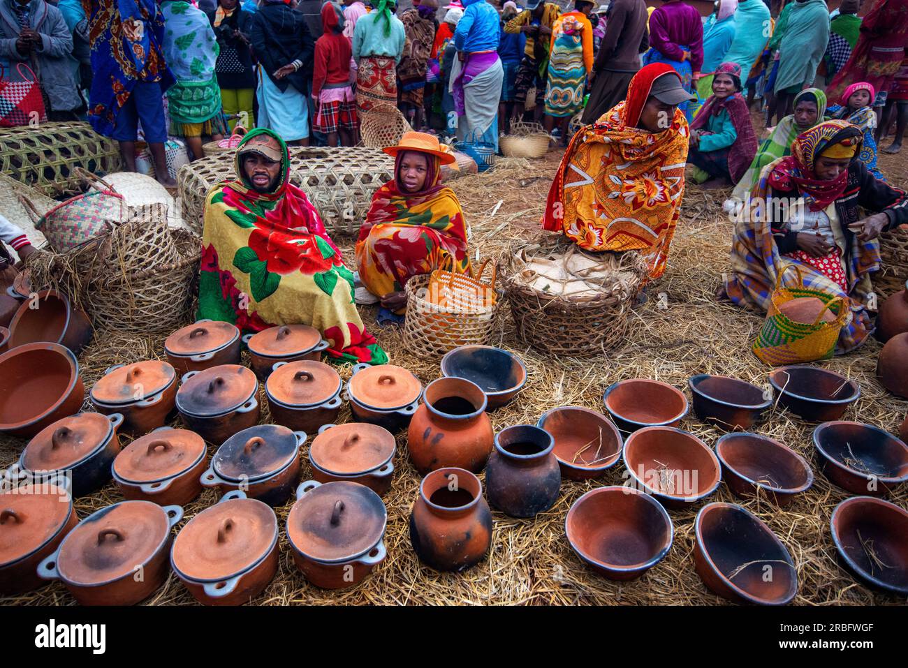 Marche Sandrandahy market, customers at pottery stall, Ambositra ...