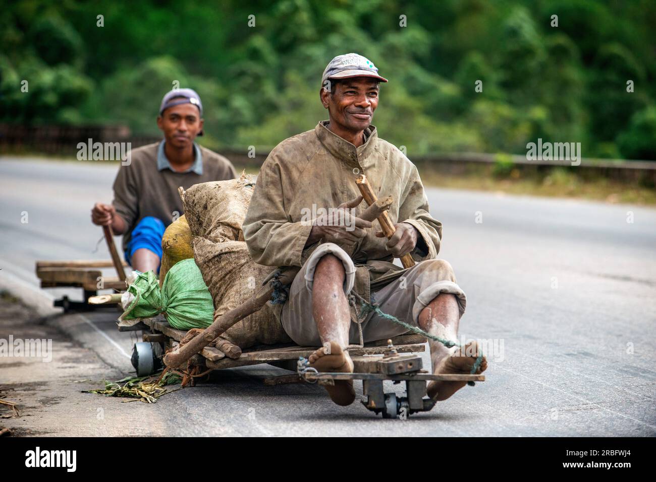 People driving a wood cart for transportation coal and other products ...