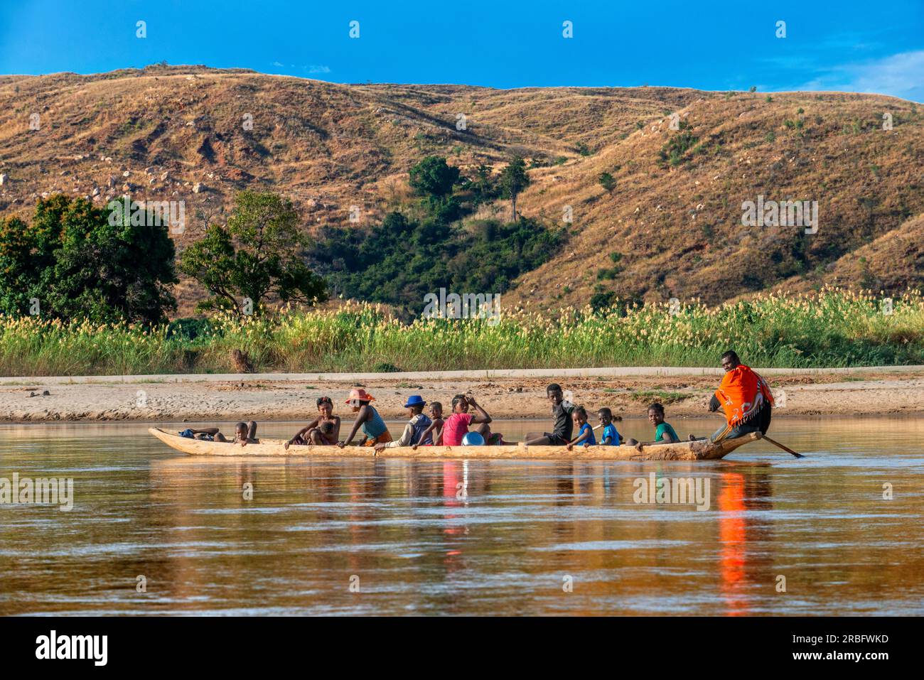 Local people in the canoe in the Tsiribihina River, Menabe region ...