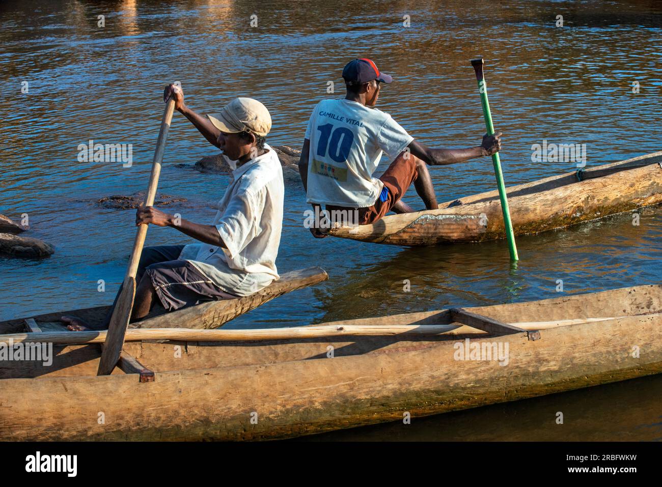 Local people in the canoe in the Tsiribihina River, Menabe region ...