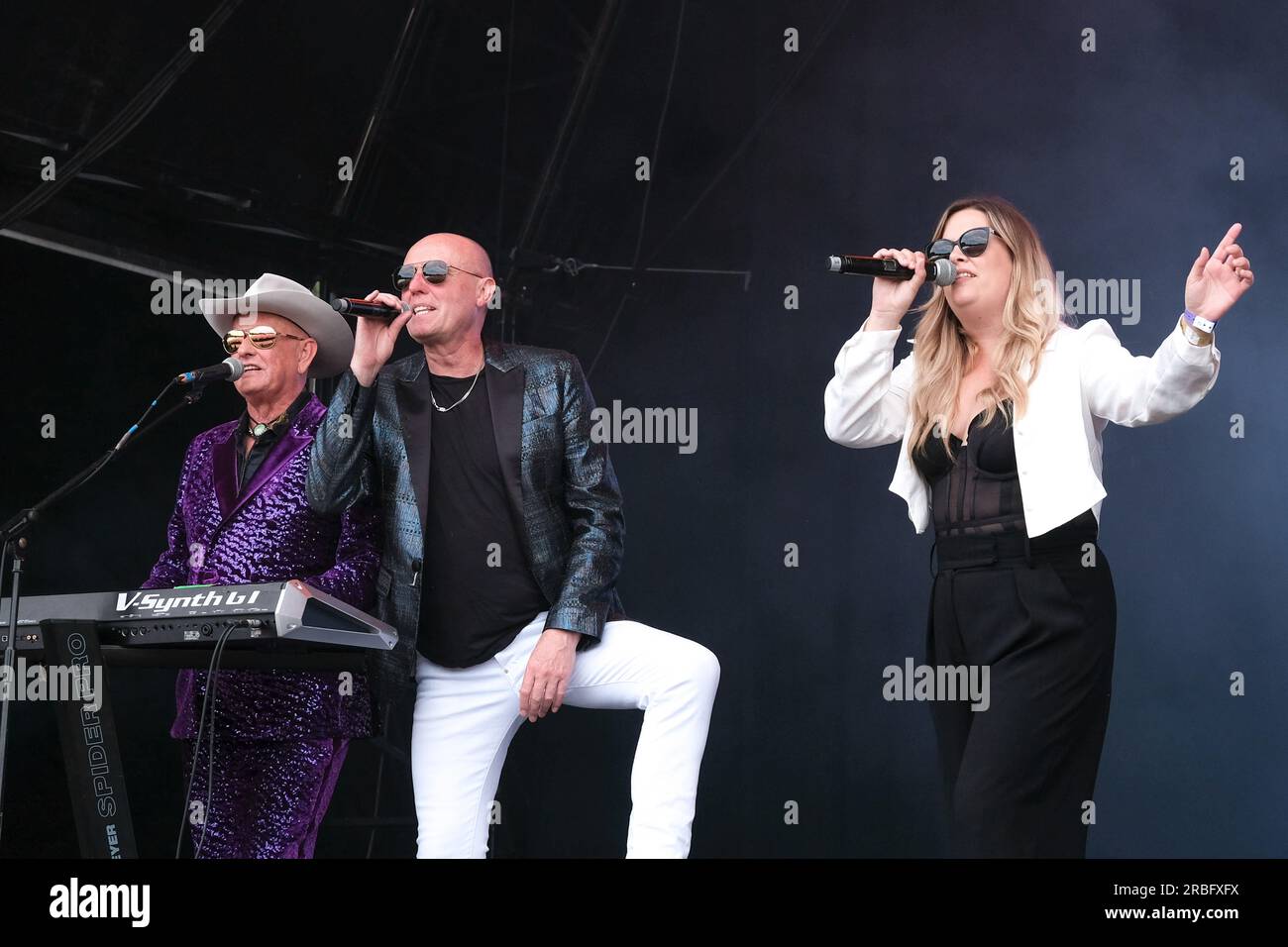 Keyboard player Martyn Ware, male vocalist Glenn Gregory, and Kelly ...