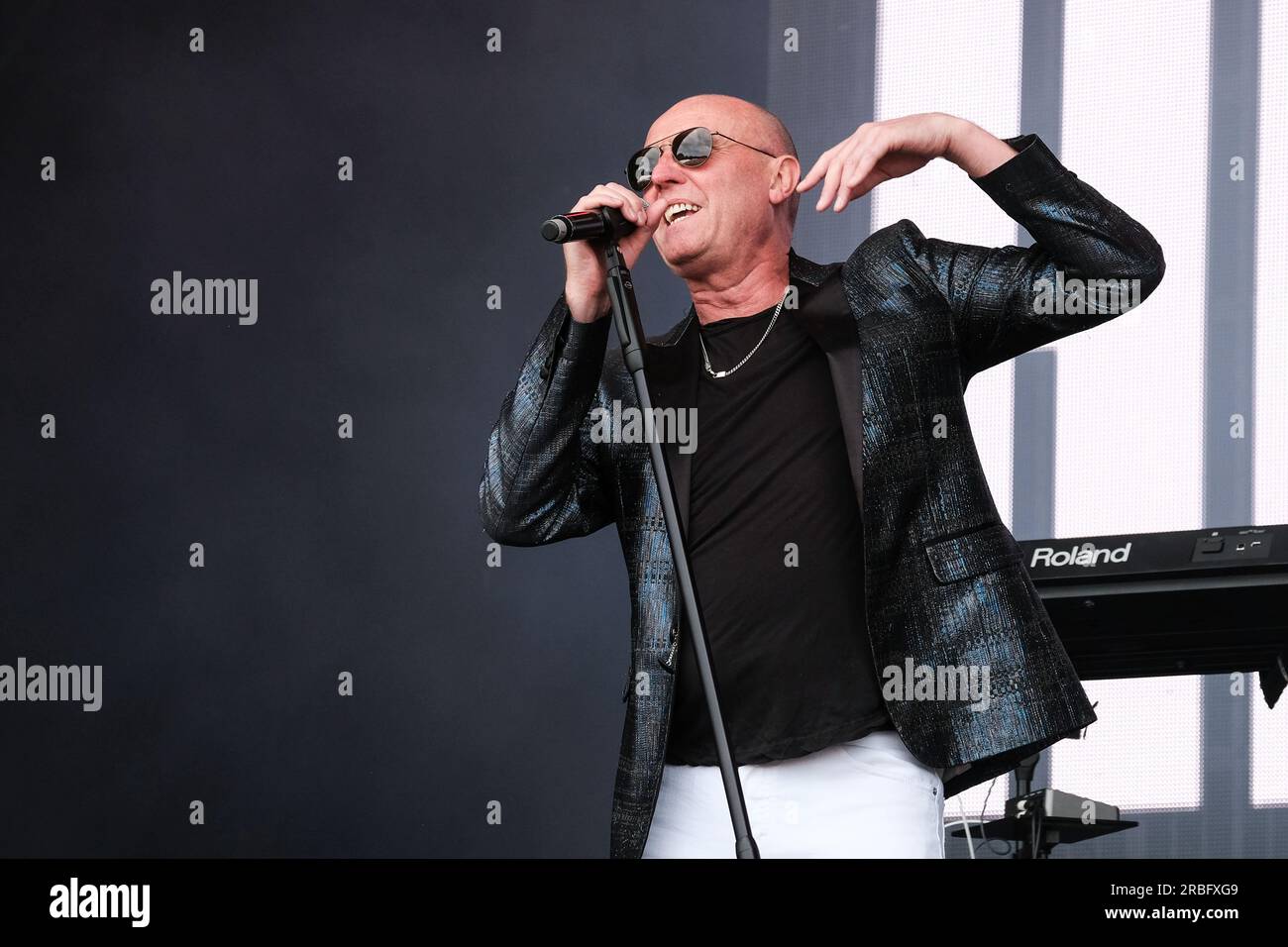 Lead male vocalist Glenn Gregory with English New Wave band Heaven 17 ...