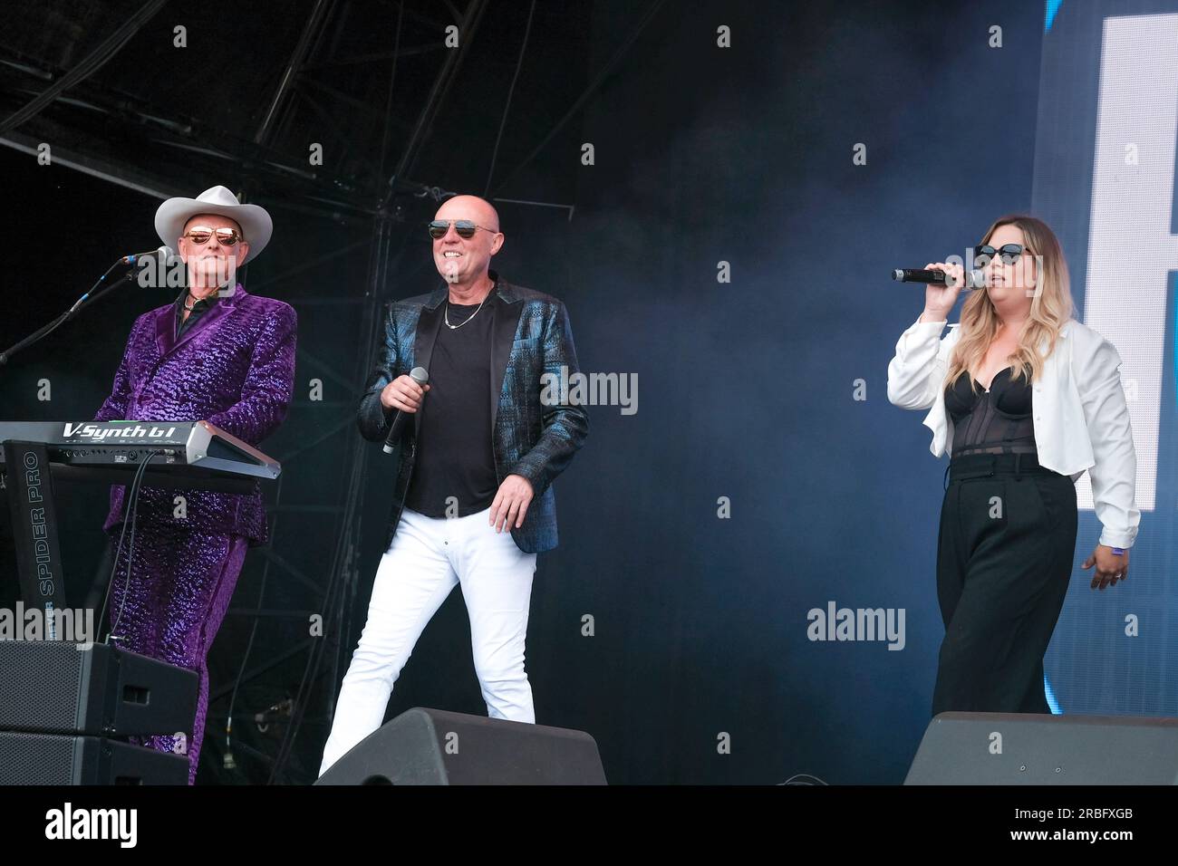 Keyboard player Martyn Ware, male vocalist Glenn Gregory, and Kelly ...