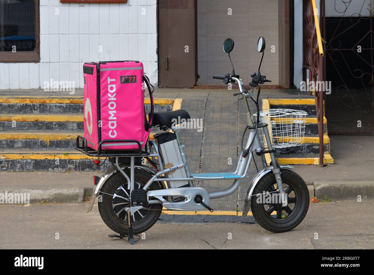Moscow, Russia - July 9. 2023. Scooter with a Samokat bag - food and ...