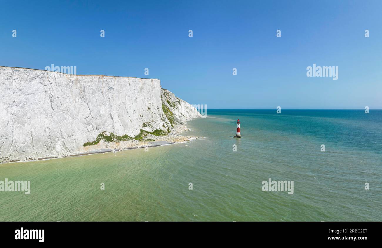Aerial view of the chalk cliffs at Beachy Head with the lighthouse ...