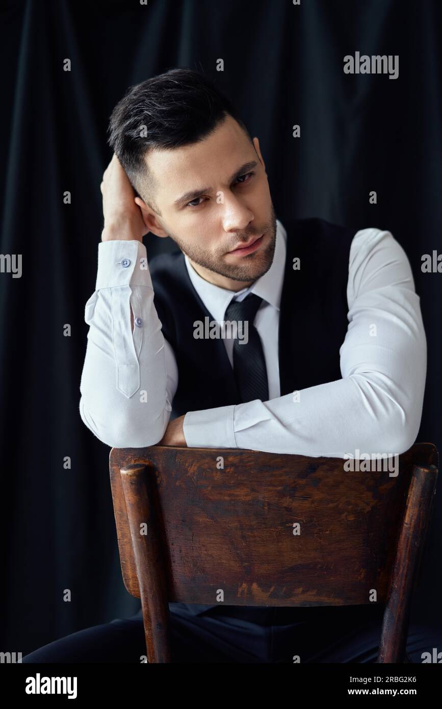 Confident serious man portrait on black background. Hansome male ...