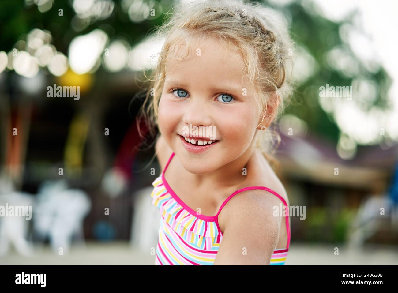 Close up portrait of happy cute little blonde girl. Smiling blonde ...