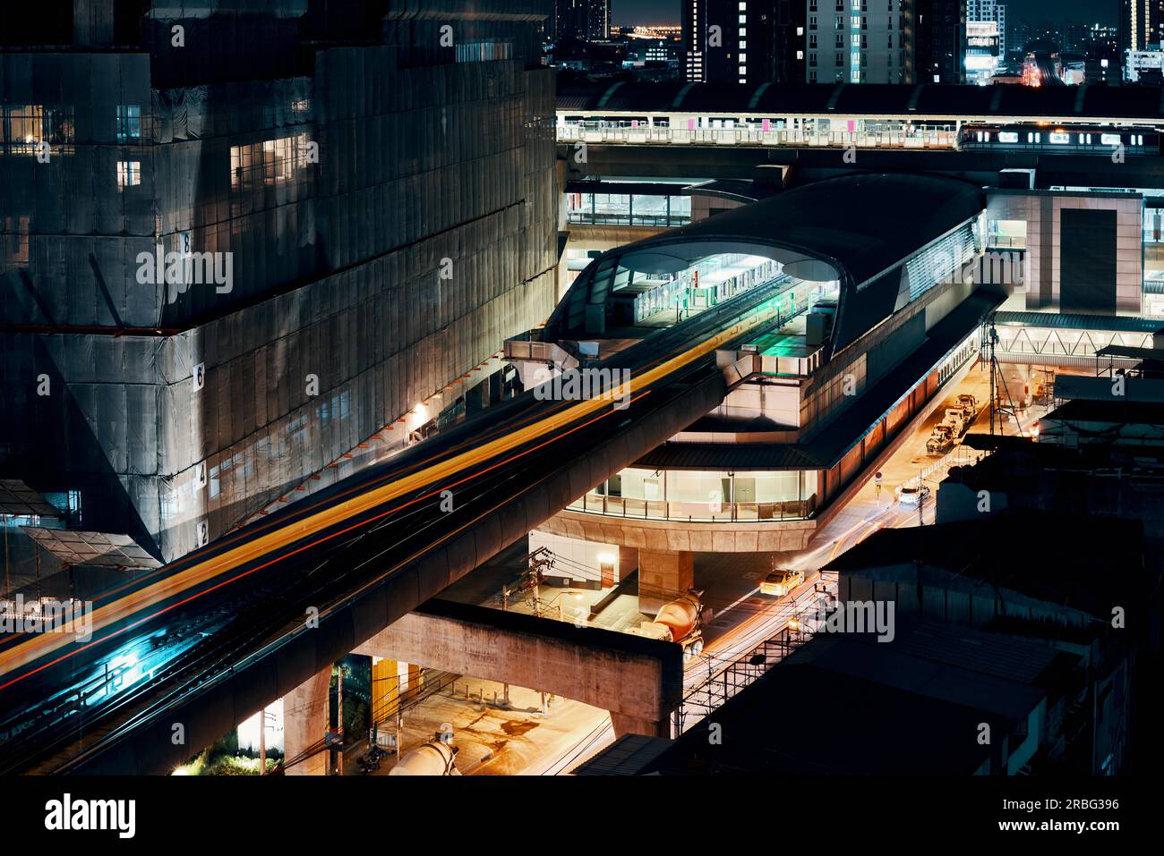 Night view of BTS sky train running in downtown of Bangkok Stock Photo ...