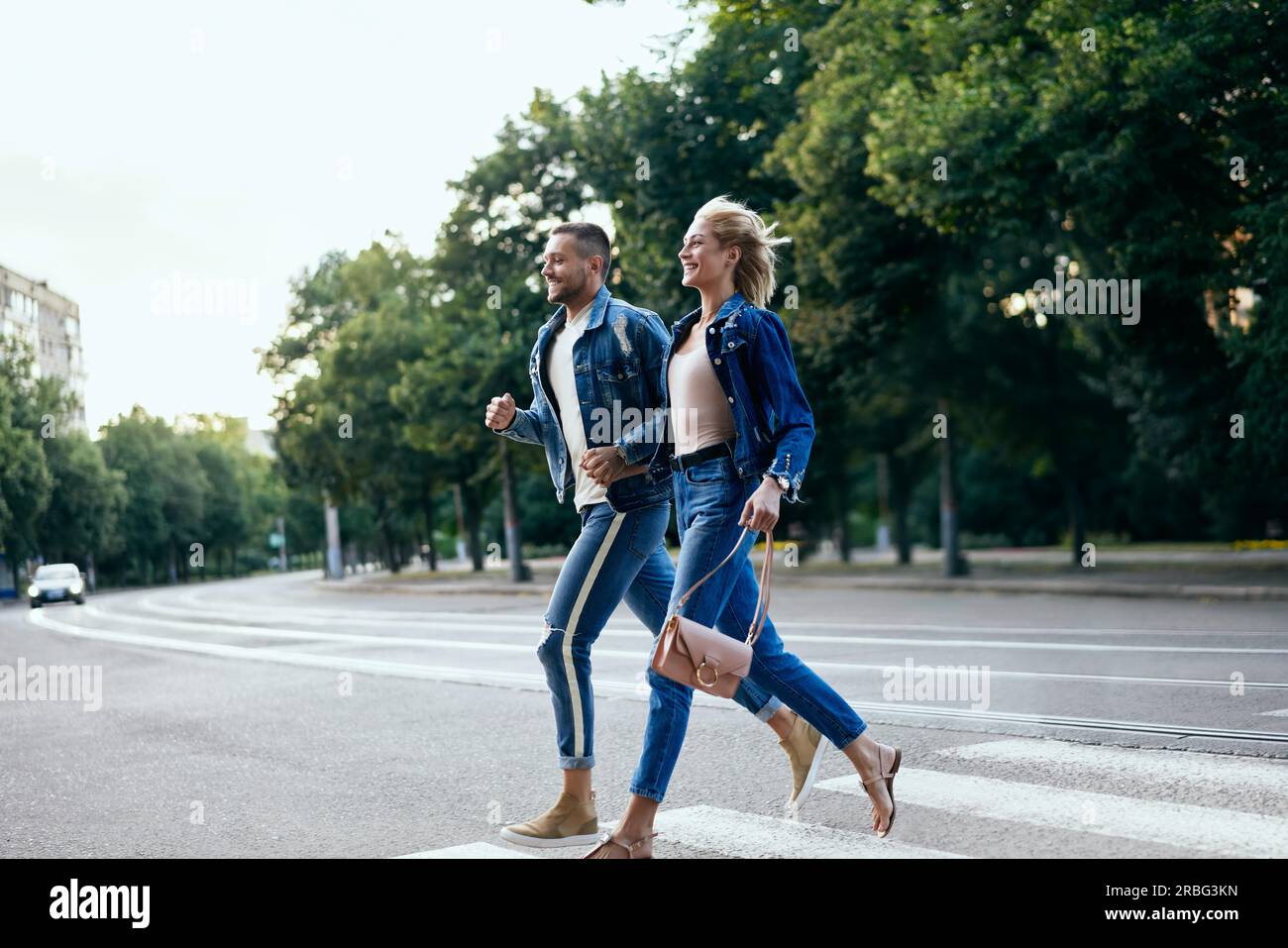 Family walking street crosswalk hi-res stock photography and images - Alamy
