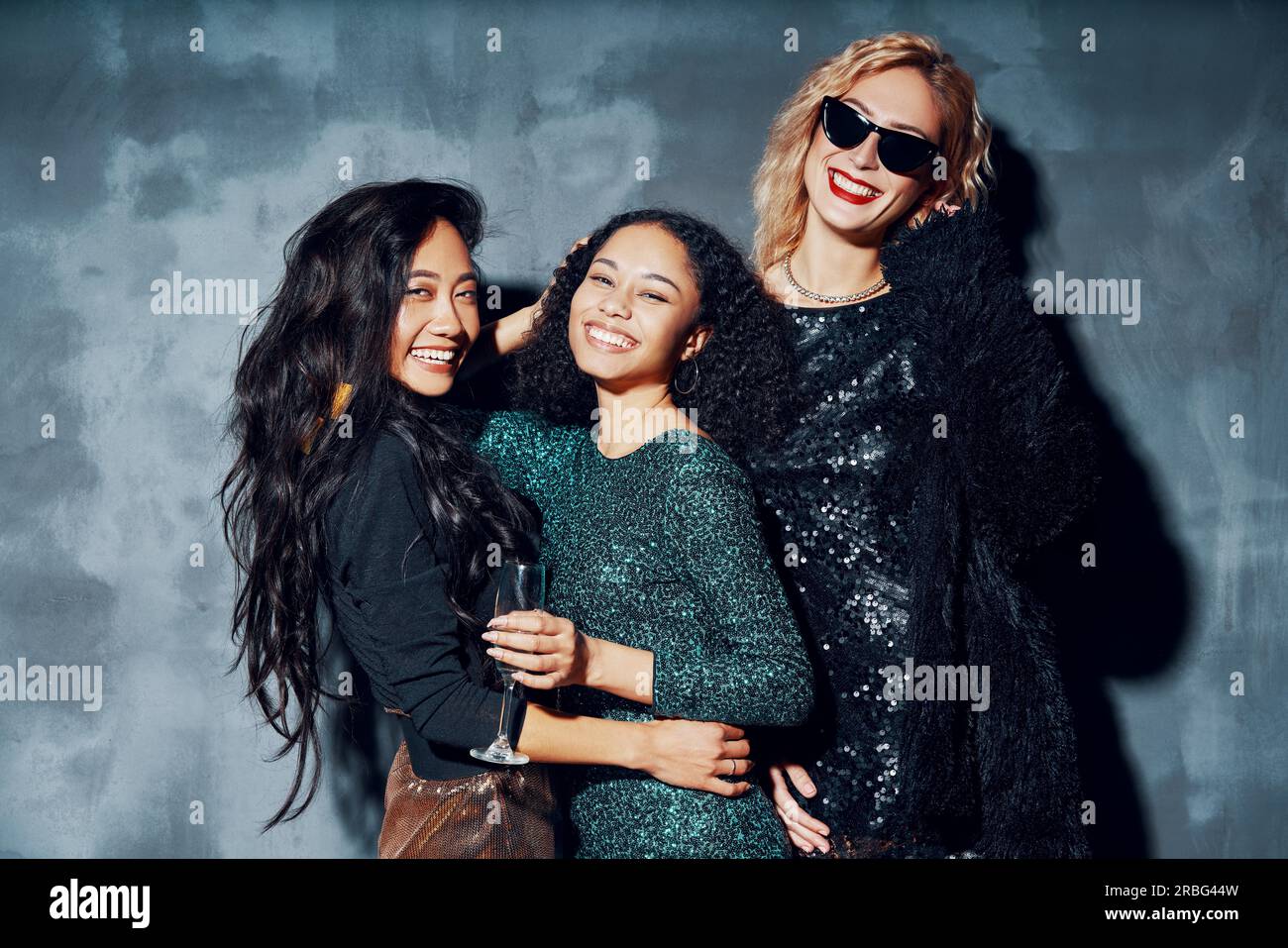 Pretty multiethnic young women have fun together. Friendship, party ...