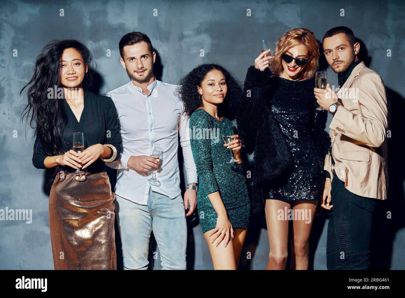 Diverse group of people posing at party time and have fun. Young ...