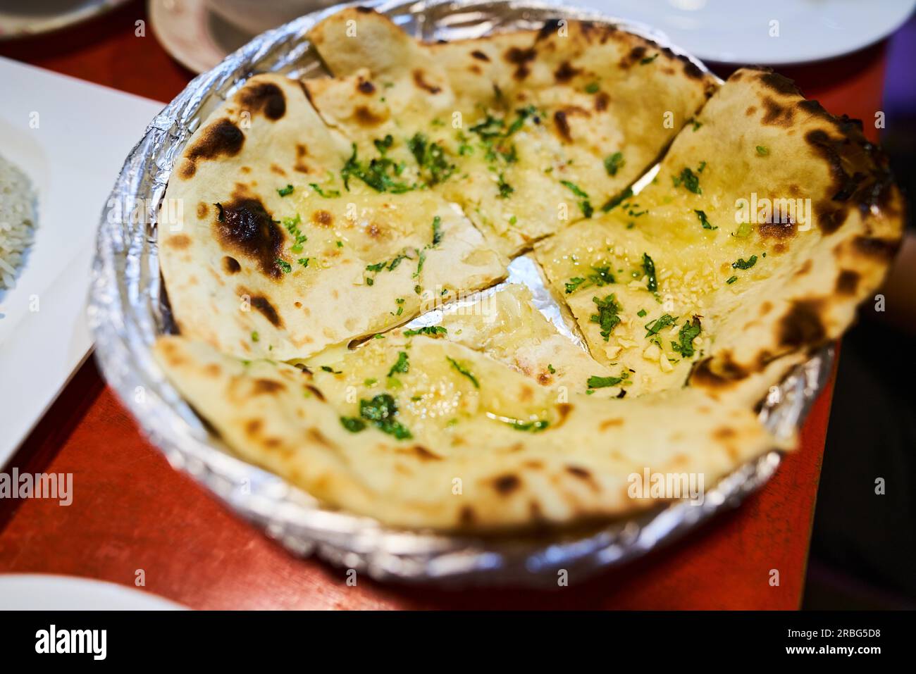 Tandoori roti hi-res stock photography and images - Alamy