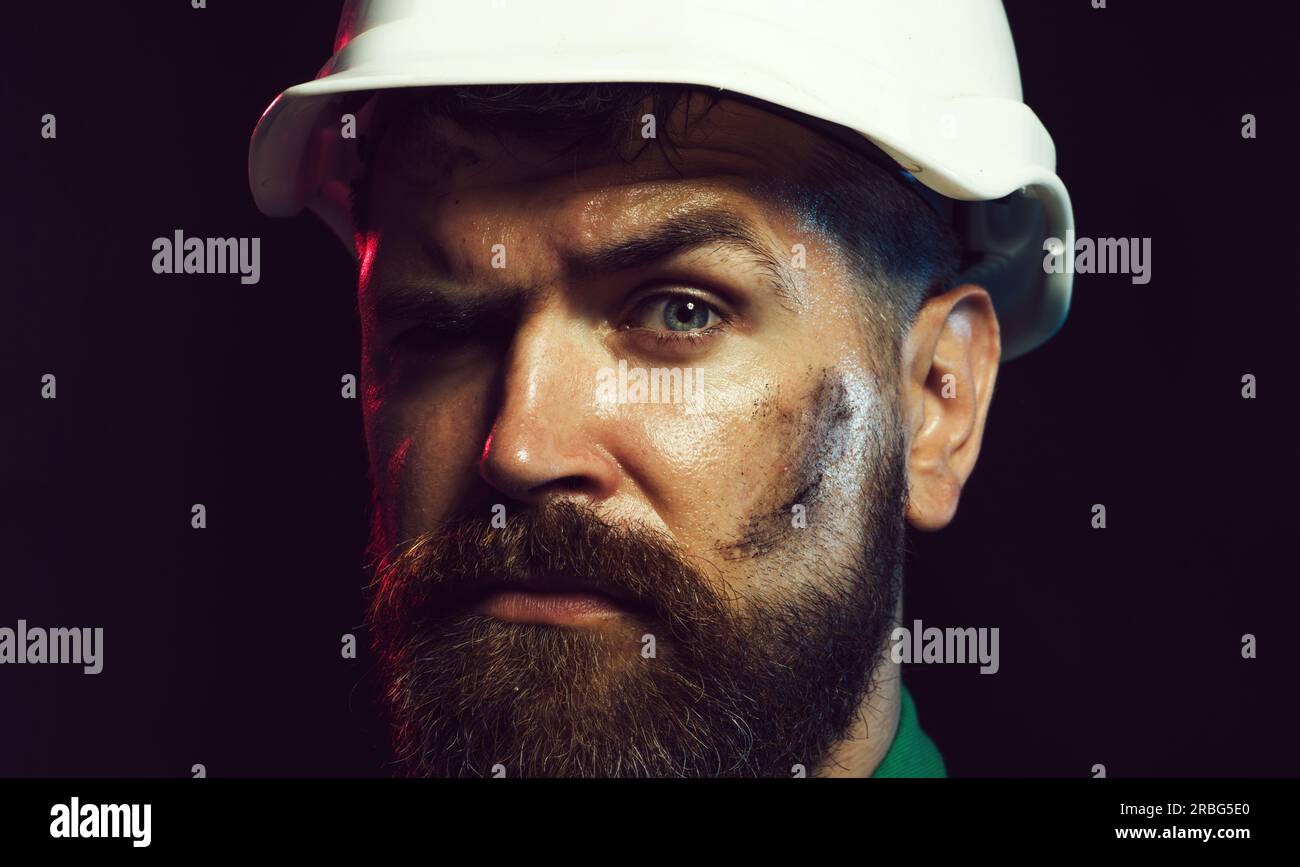 Closeup portrait of mechanical worker in hardhat. Industrial worker in ...