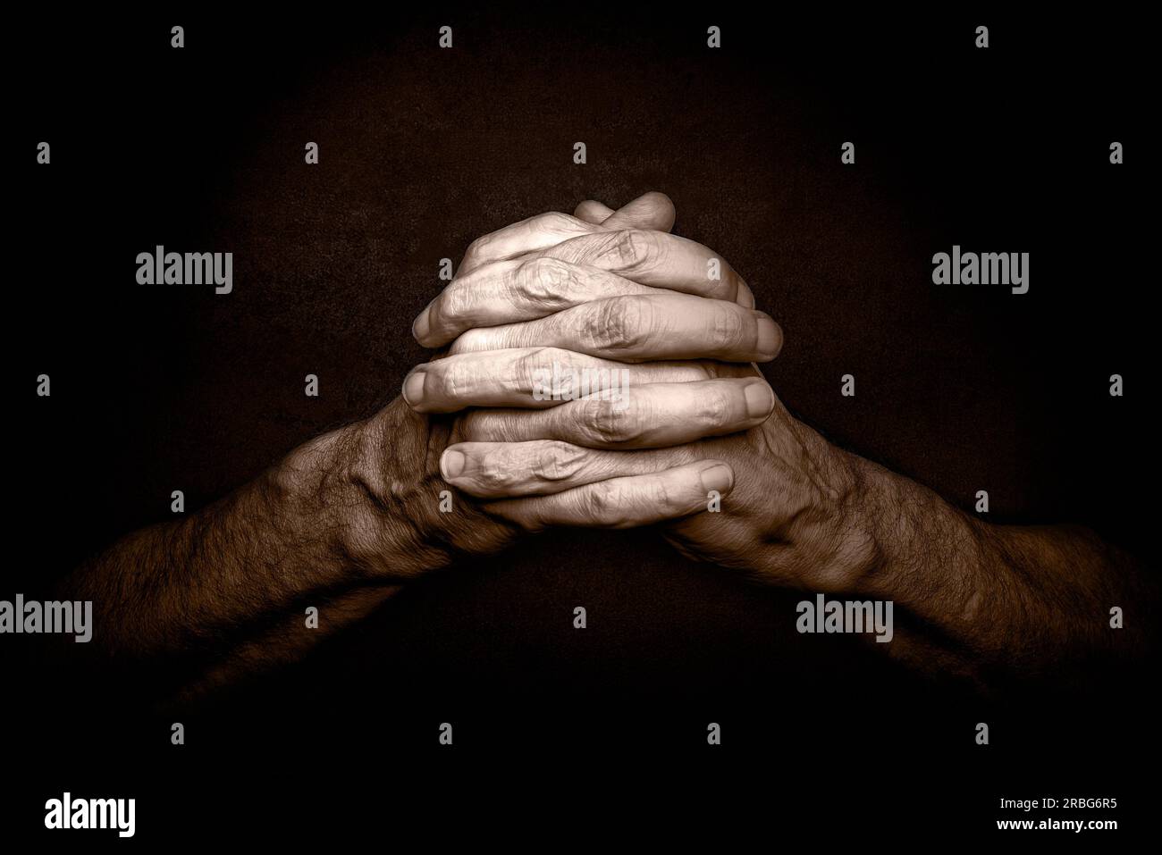 Man's Hands with crossed fingers. This is a classical gesture of a ...