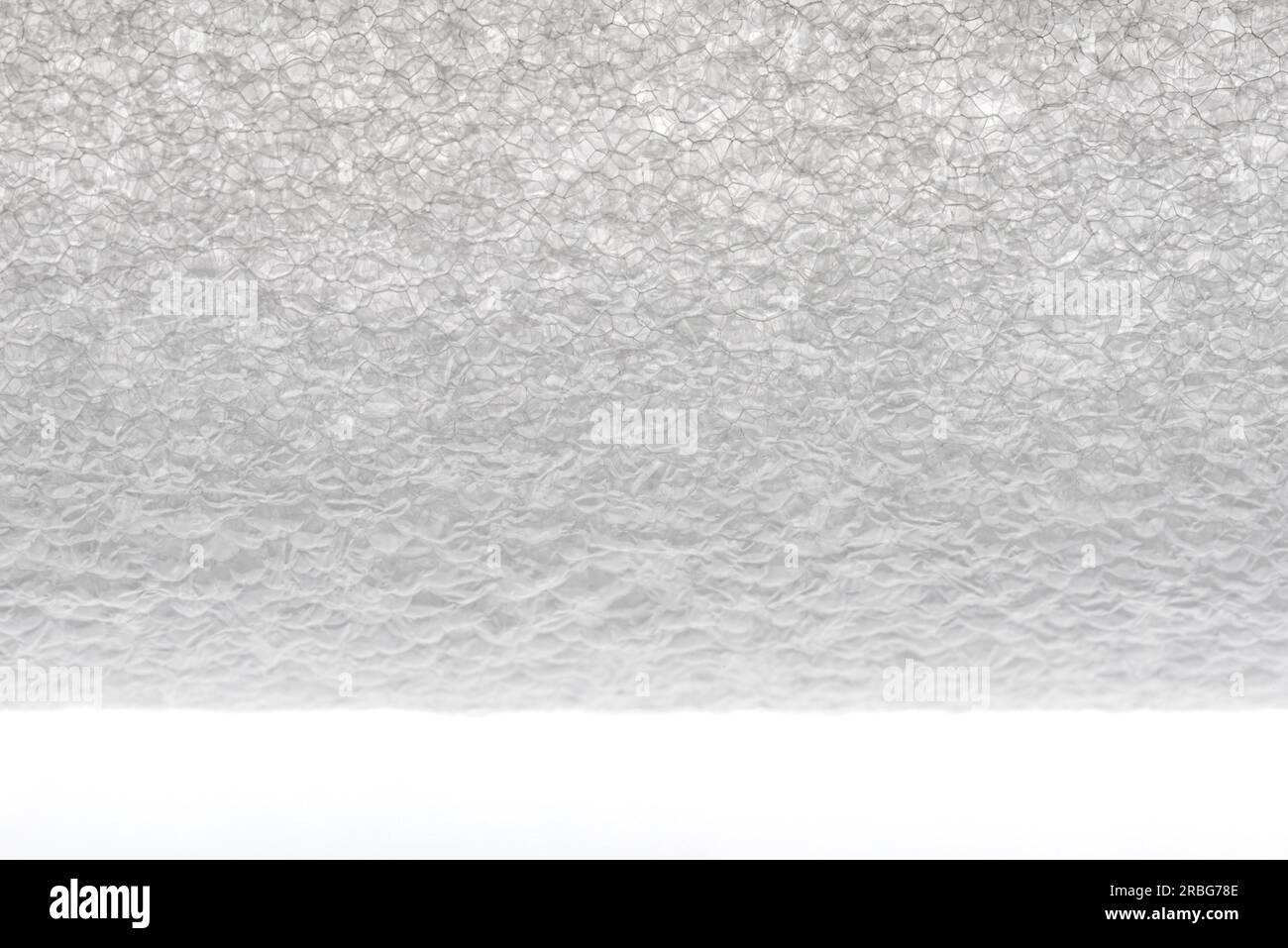 A white extruded polyethylene foam tube texture isolated on white ...