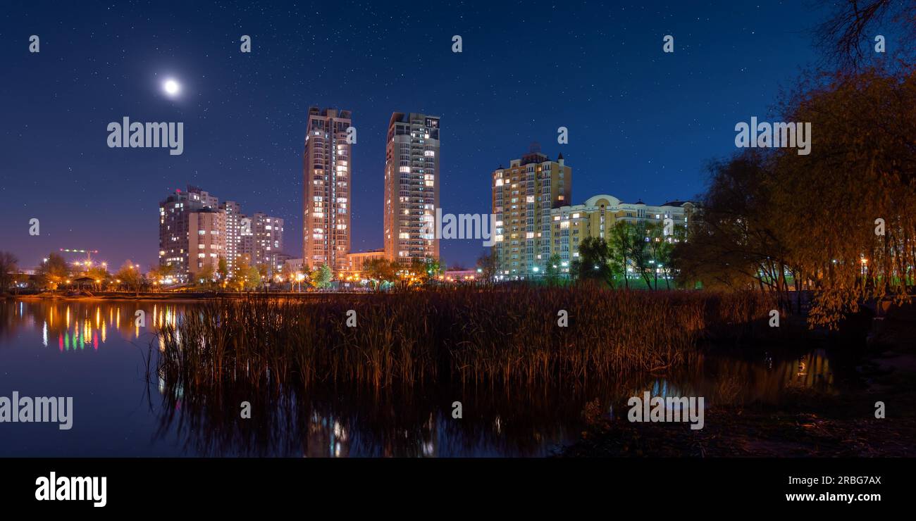 Night view of modern buildings in the obolon district of Kiev, Ukraine ...