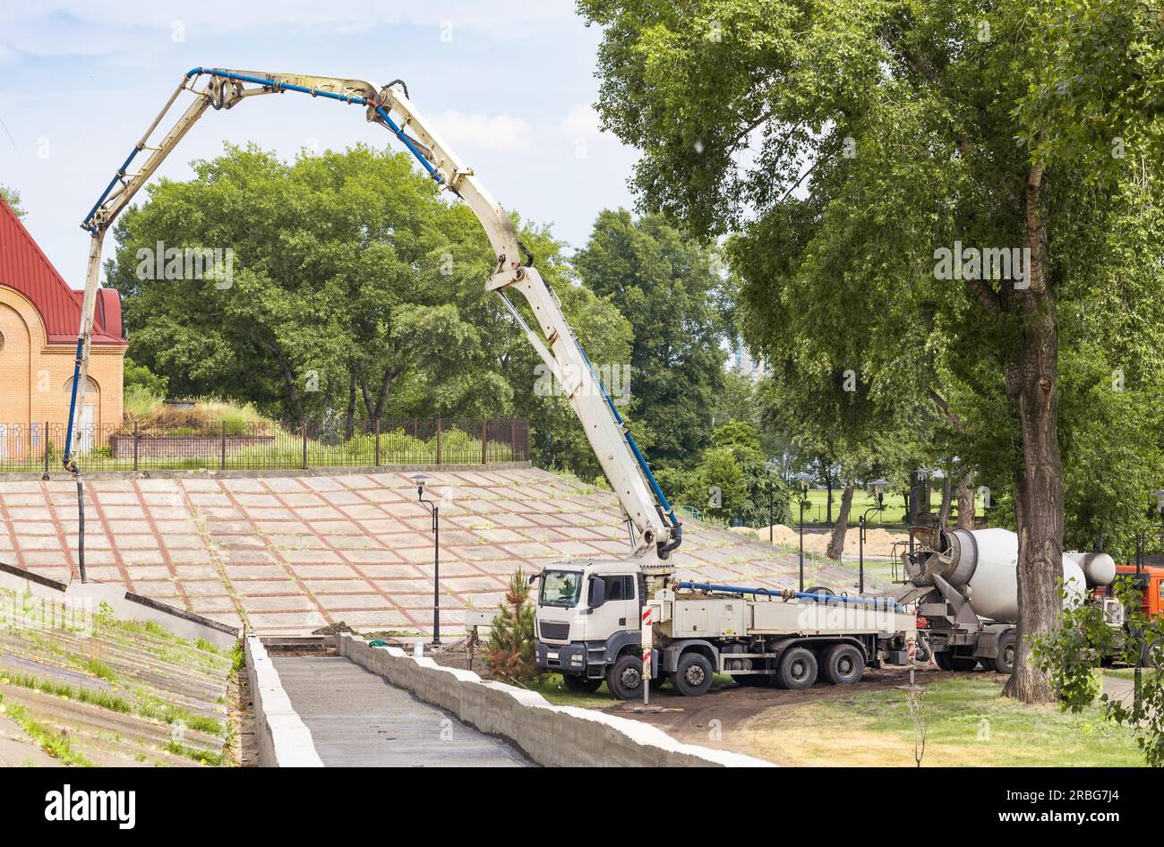 Truck mounted concrete pump on a construction site Stock Photo - Alamy