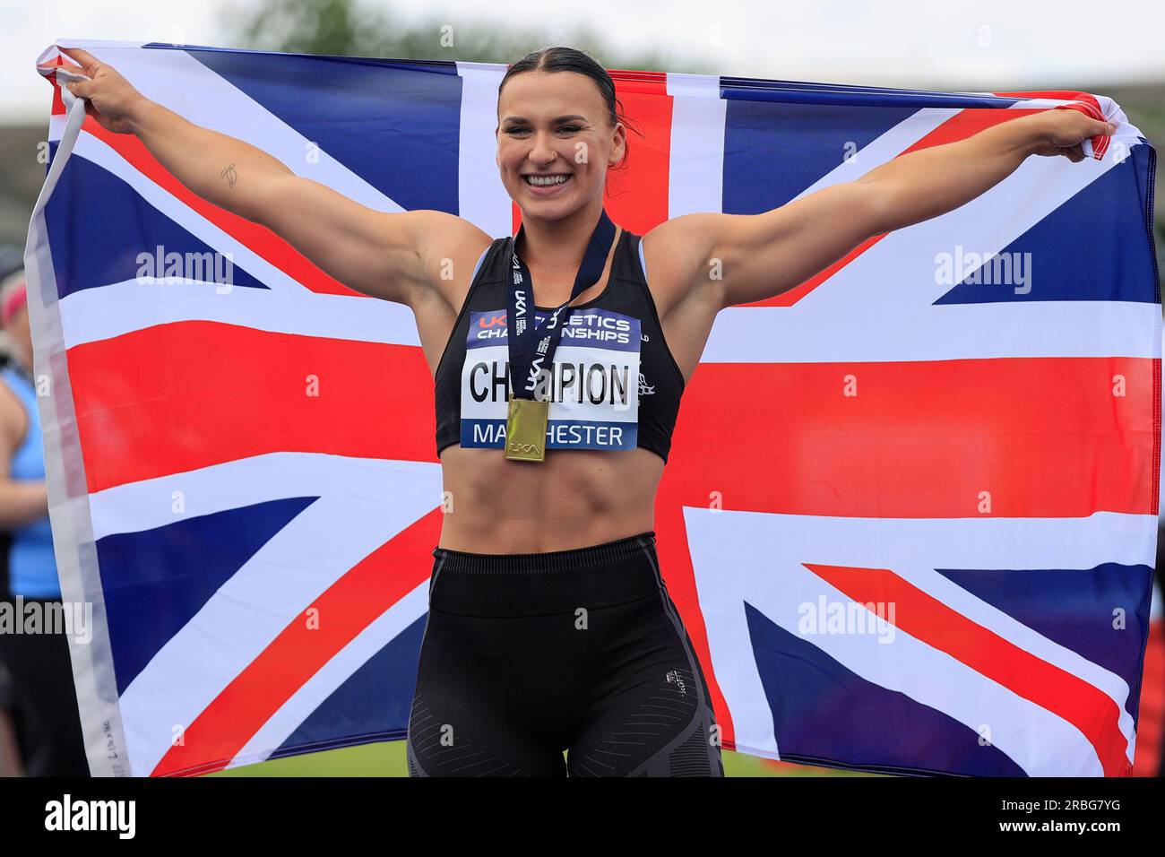Adele Nicoll with her gold medal for winning the women’s shot put ...