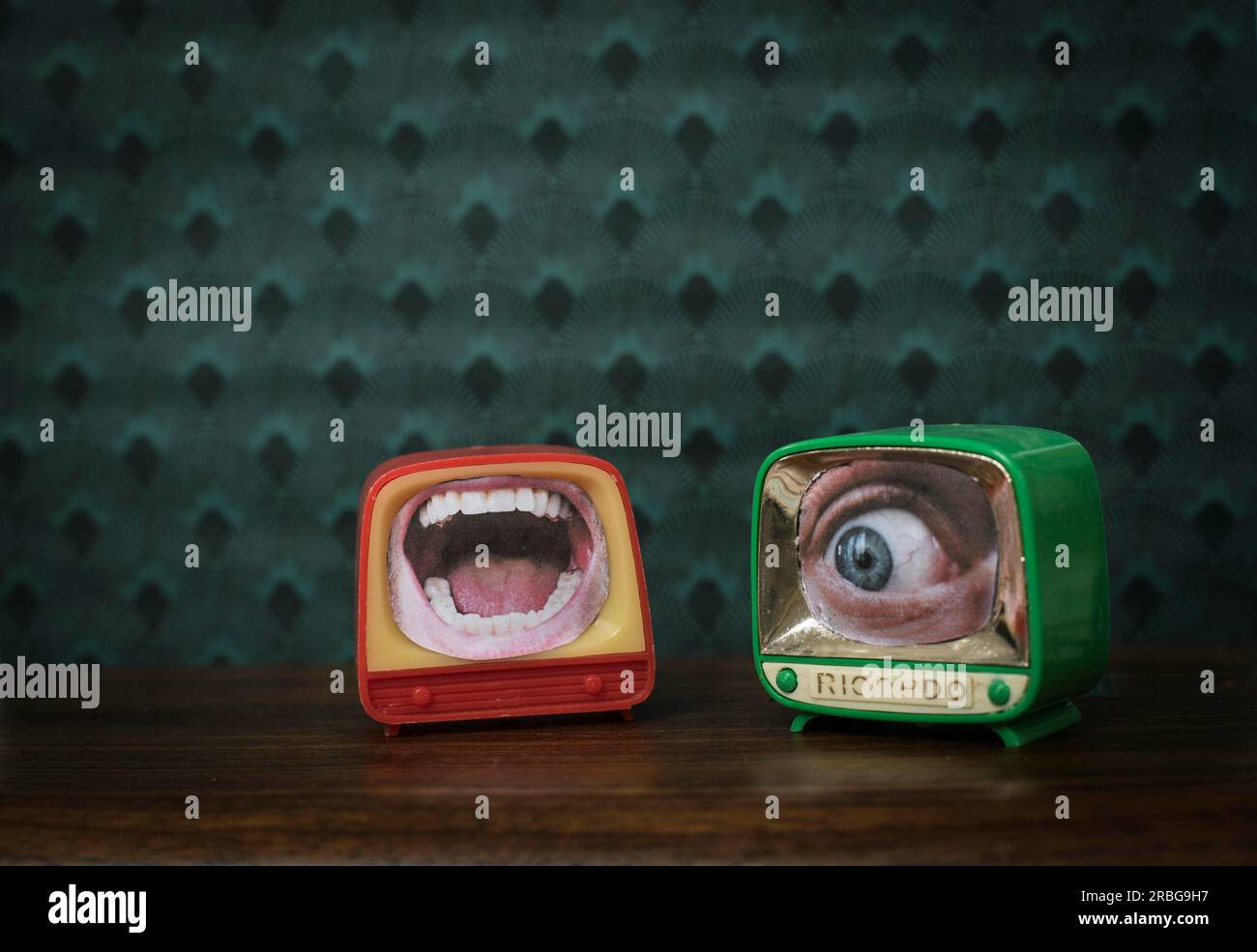 Small Vintage TV's with Eye and Mouth Stock Photo - Alamy