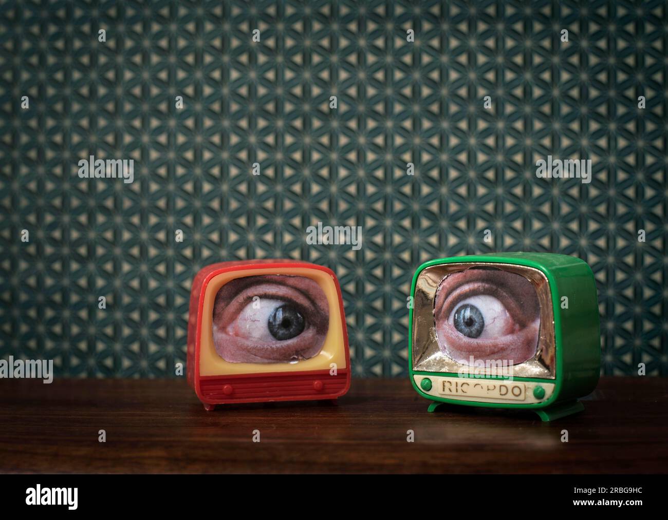Small TVs with eyes Stock Photo - Alamy