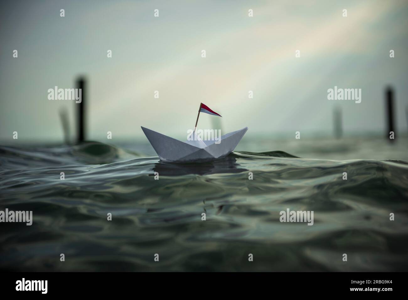 Paper ship on the sea Stock Photo - Alamy
