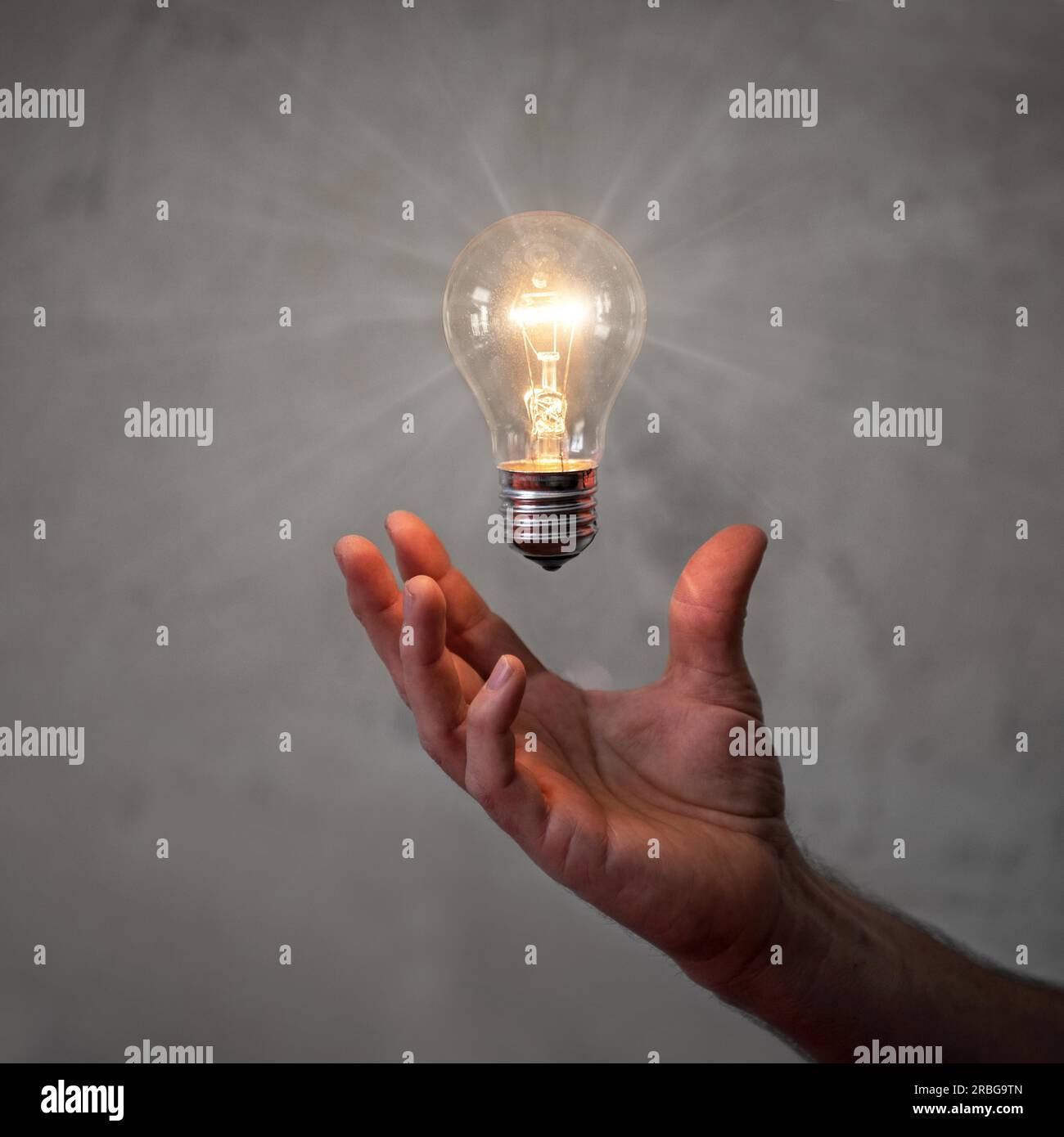 Glowing Vintage Light Pulp and Hand Stock Photo - Alamy