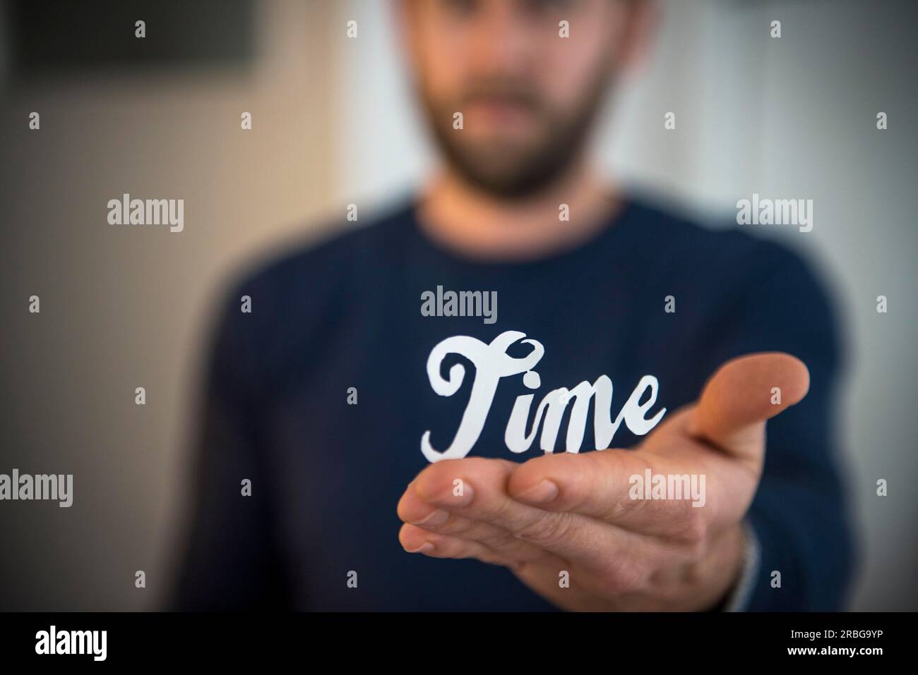 Time text on hand Stock Photo - Alamy