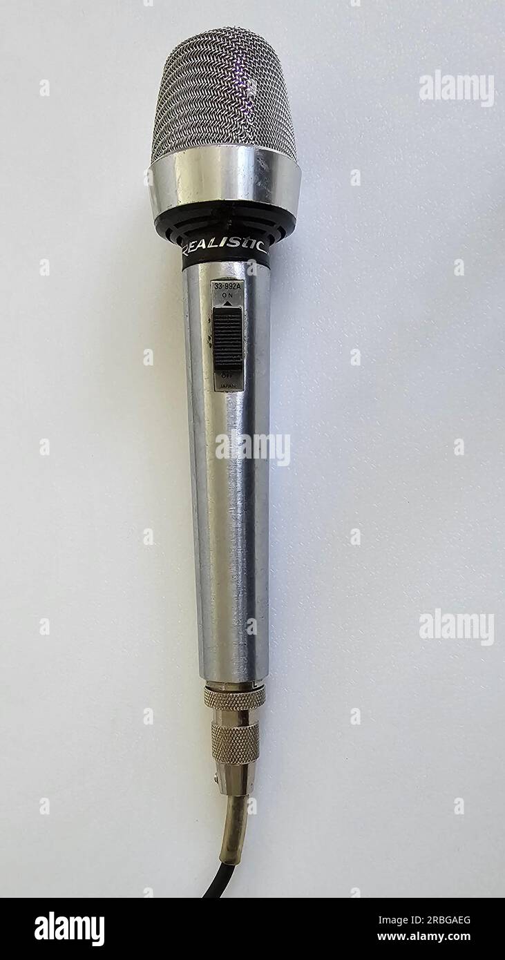 Stainless Steele vintage microphone with cord Stock Photo - Alamy