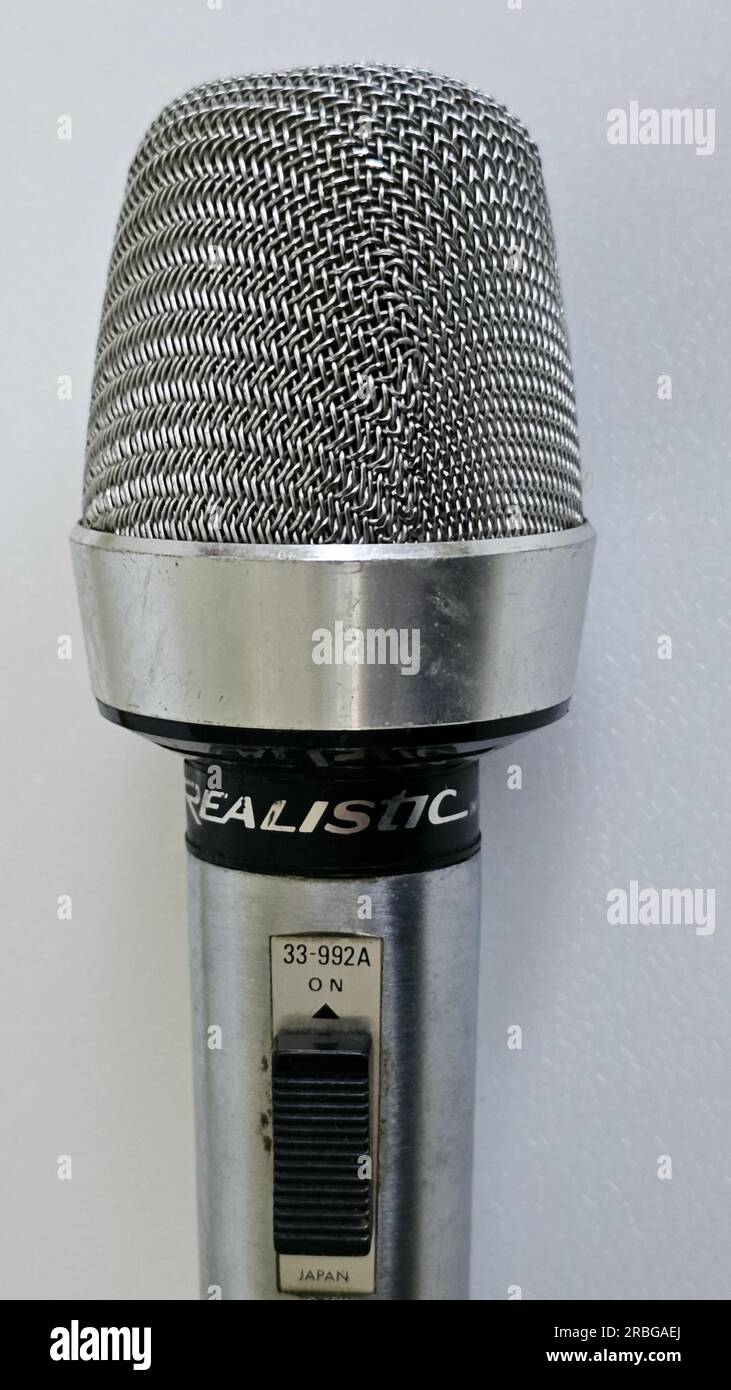 Stainless Steele vintage microphone with cord Stock Photo - Alamy