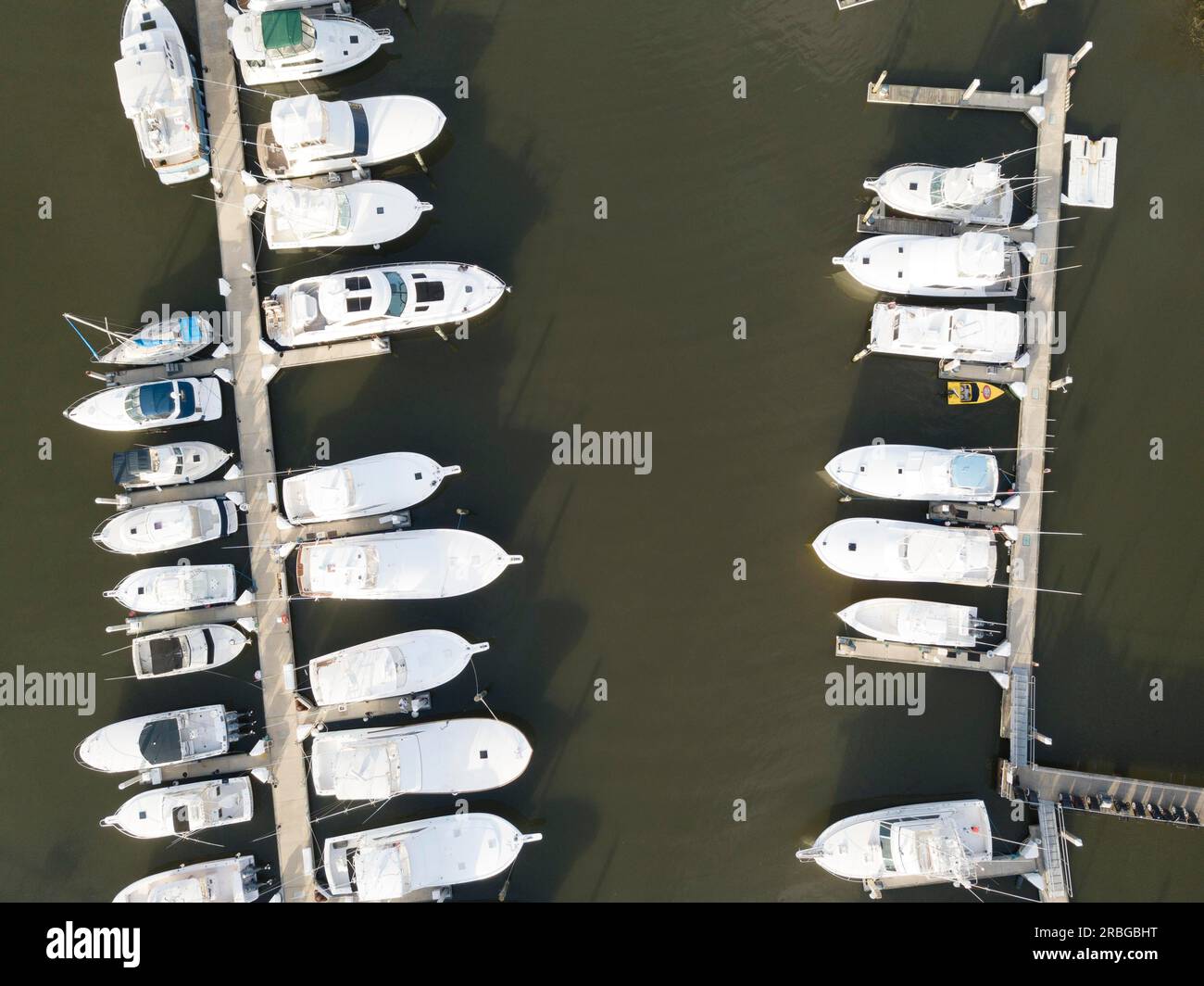 Aerial views of boats on the ocean near a city Stock Photo - Alamy