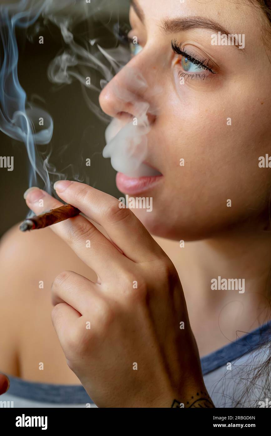 Beautiful woman colored smoke in hi-res stock photography and images ...