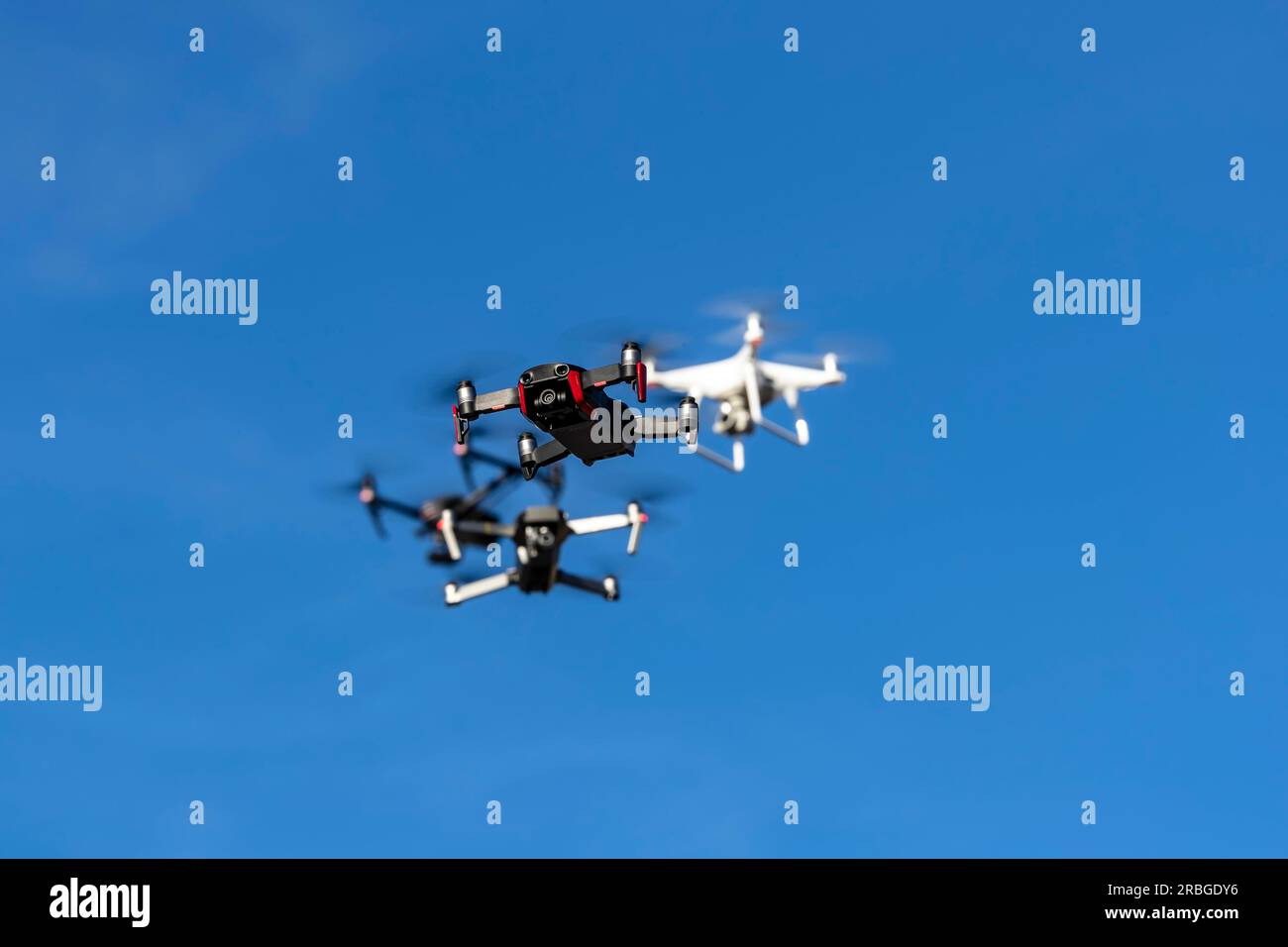 Group drones in blue hi-res stock photography and images - Alamy