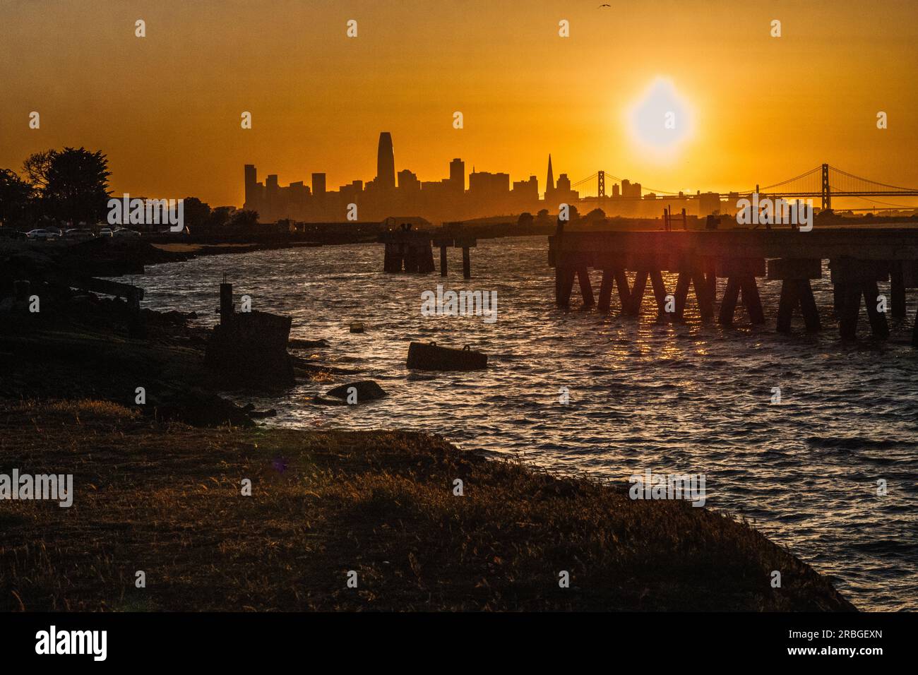 San Francisco Bay, the city and the Bay Bridge at sunset as seen from ...